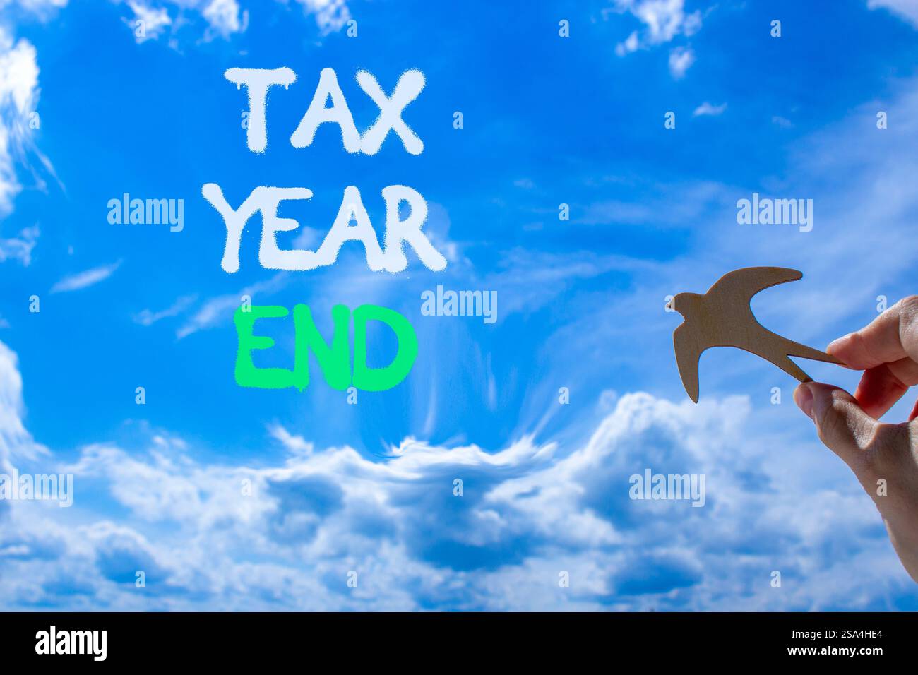 Tax year end symbol. Concept words Tax year end on beautiful blue sky ...