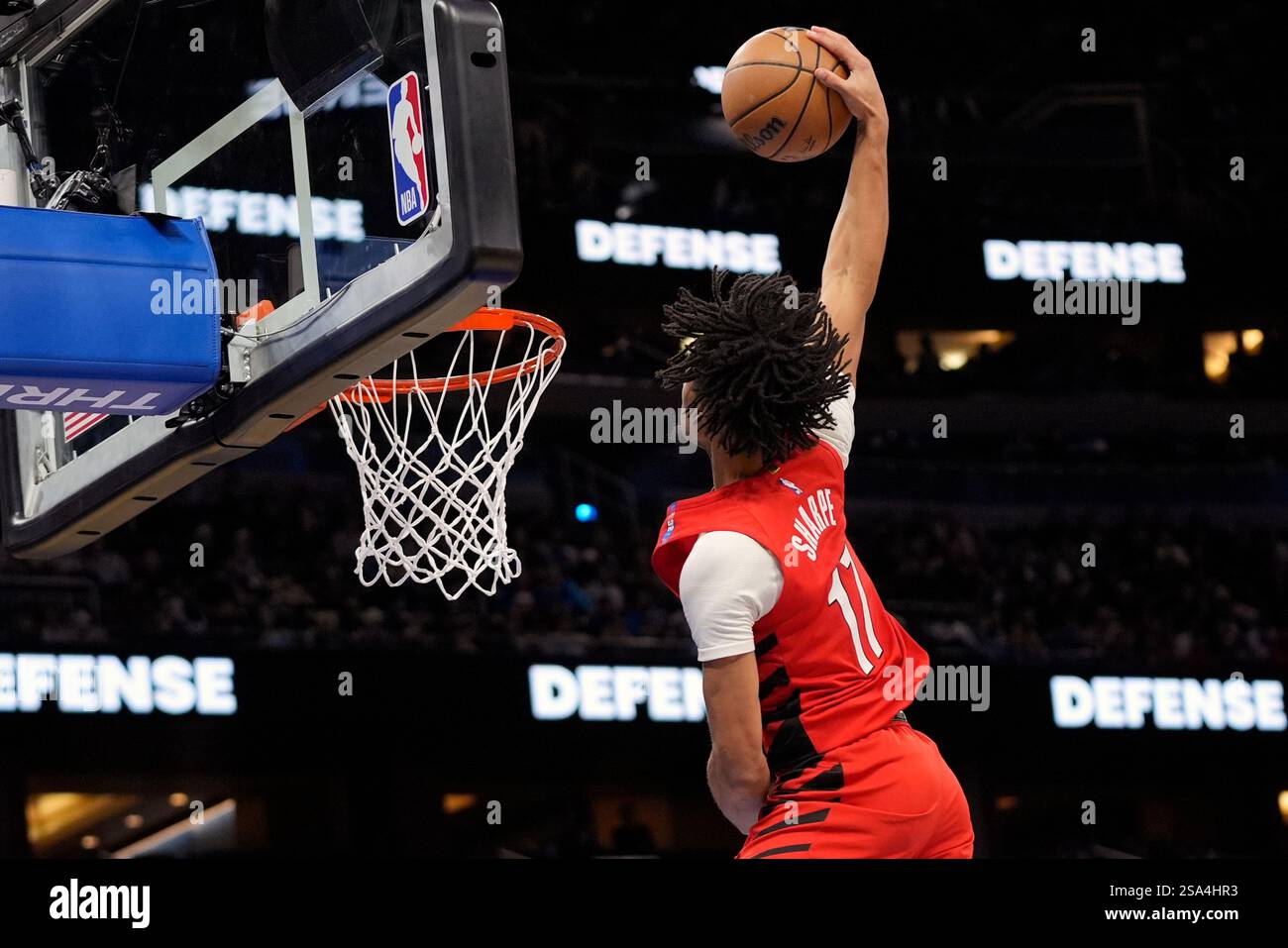 Portland Trail Blazers guard Shaedon Sharpe (17) dunks the ball against the Orlando Magic during ...