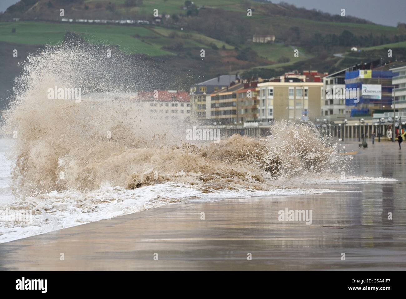 The waves break against the coast, on January 28, 2025, in Zarautz ...