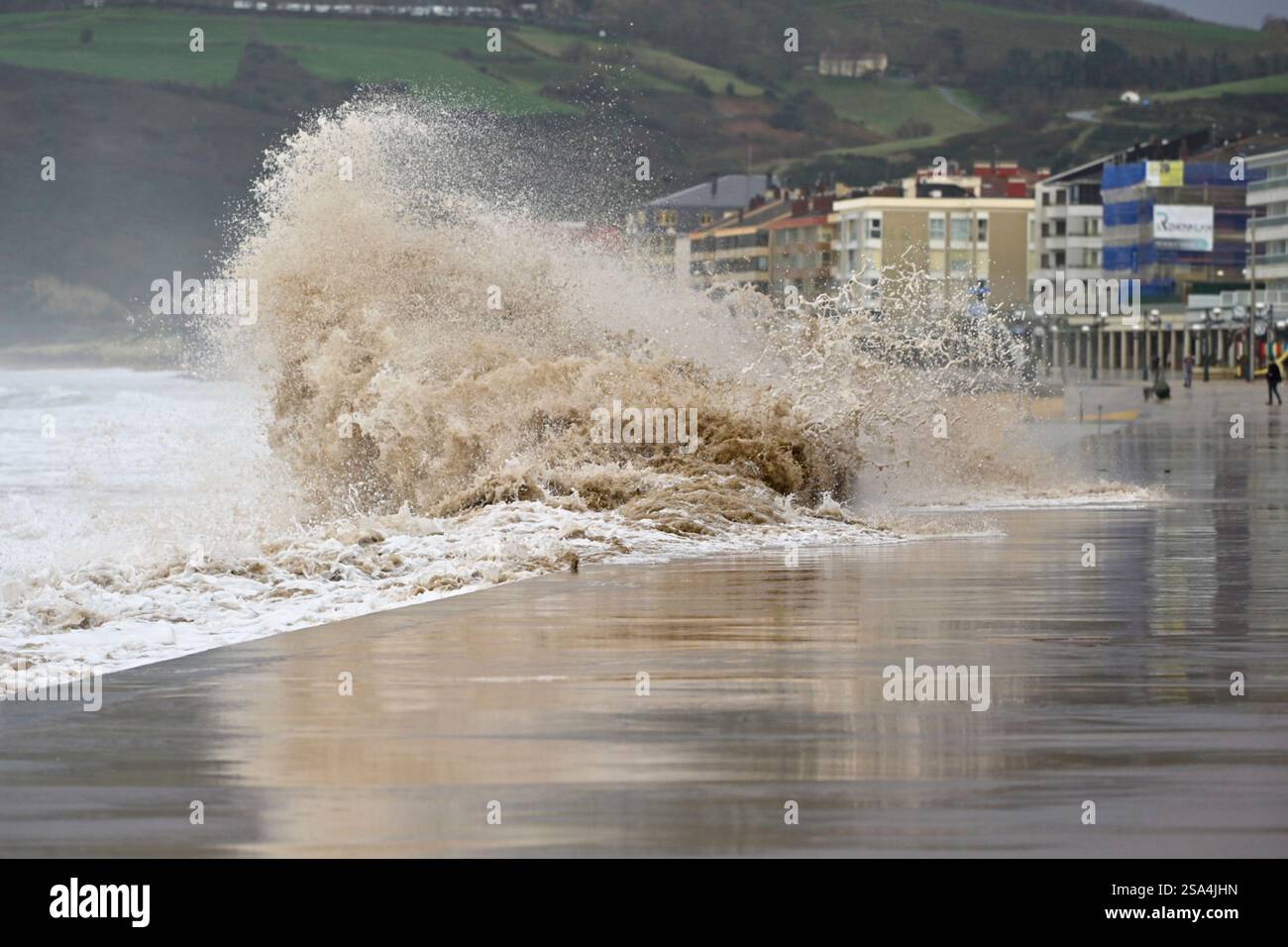 The waves break against the coast, on January 28, 2025, in Zarautz ...