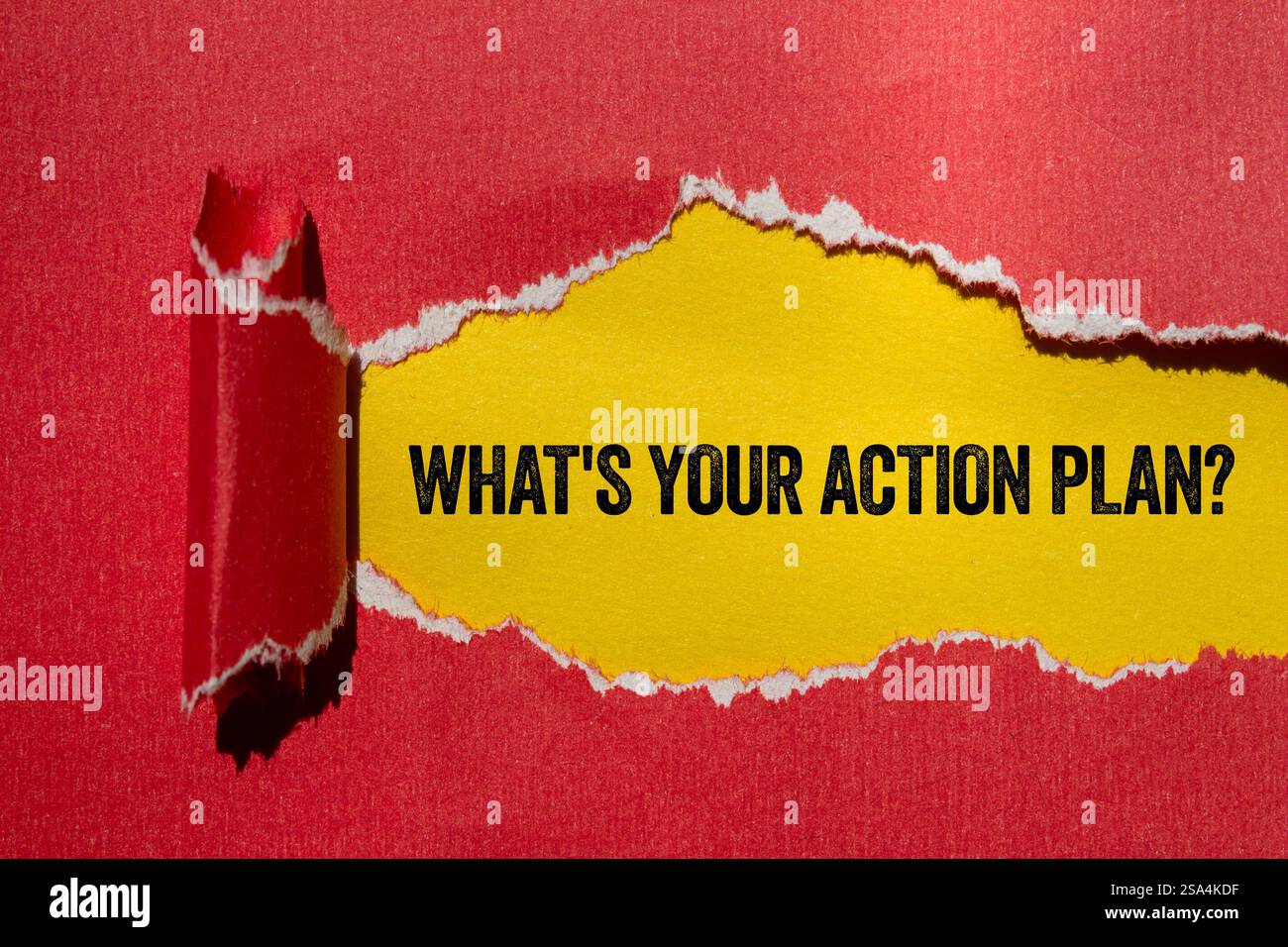 What's your action plan message written on ripped torn red paper on yellow background ...