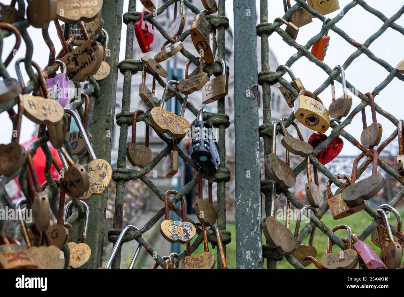 Colorful locks symbolize love and commitment at a city landmark Stock ...