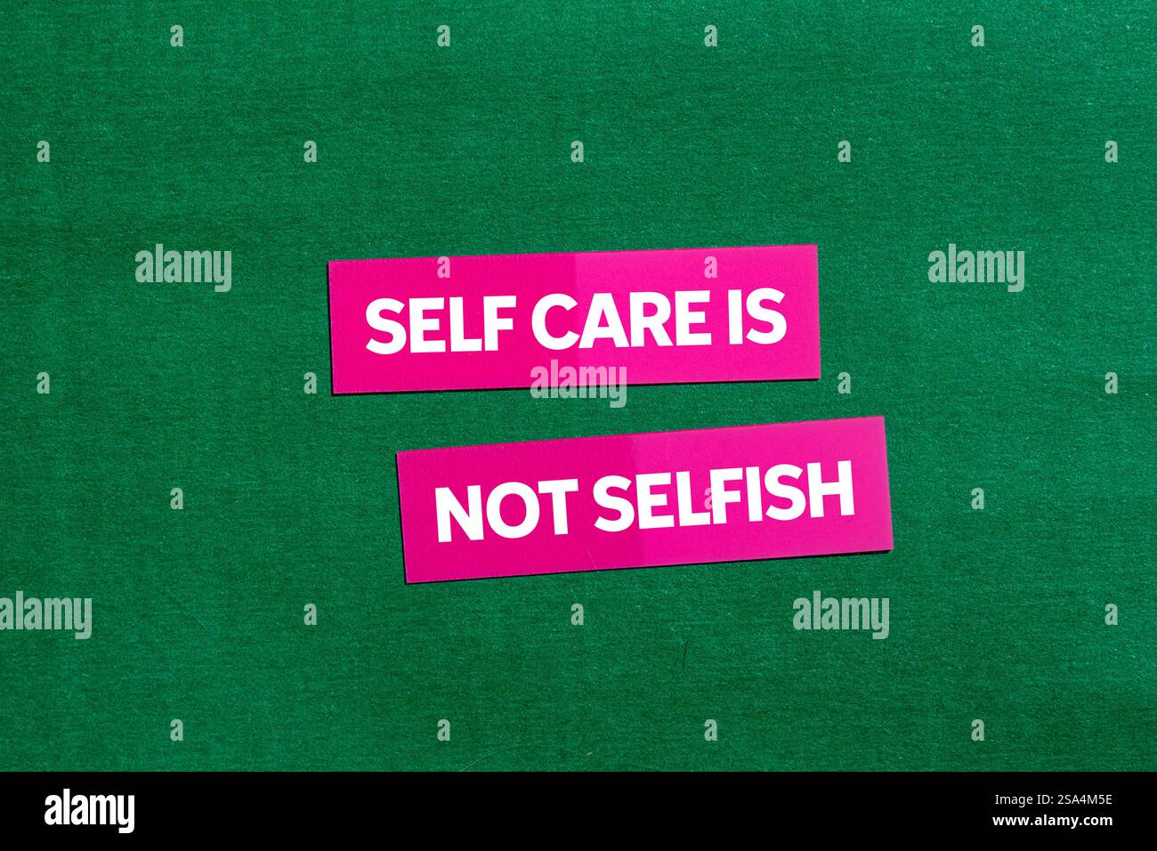 Self care is not selfish message written on pink stickers on green ...