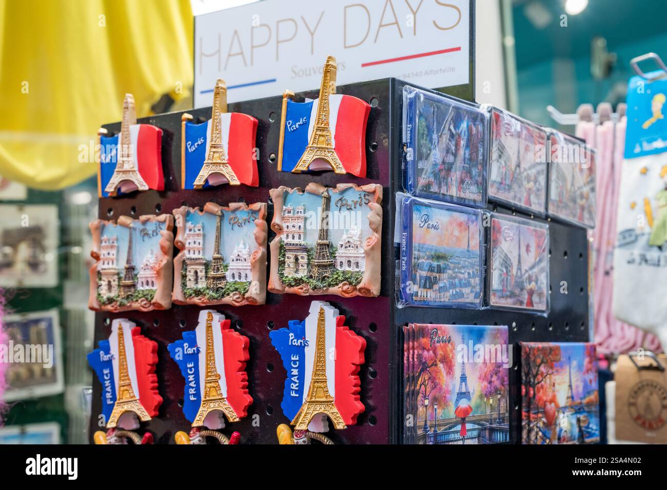 Colorful souvenirs display in a charming shop celebrating Parisian ...