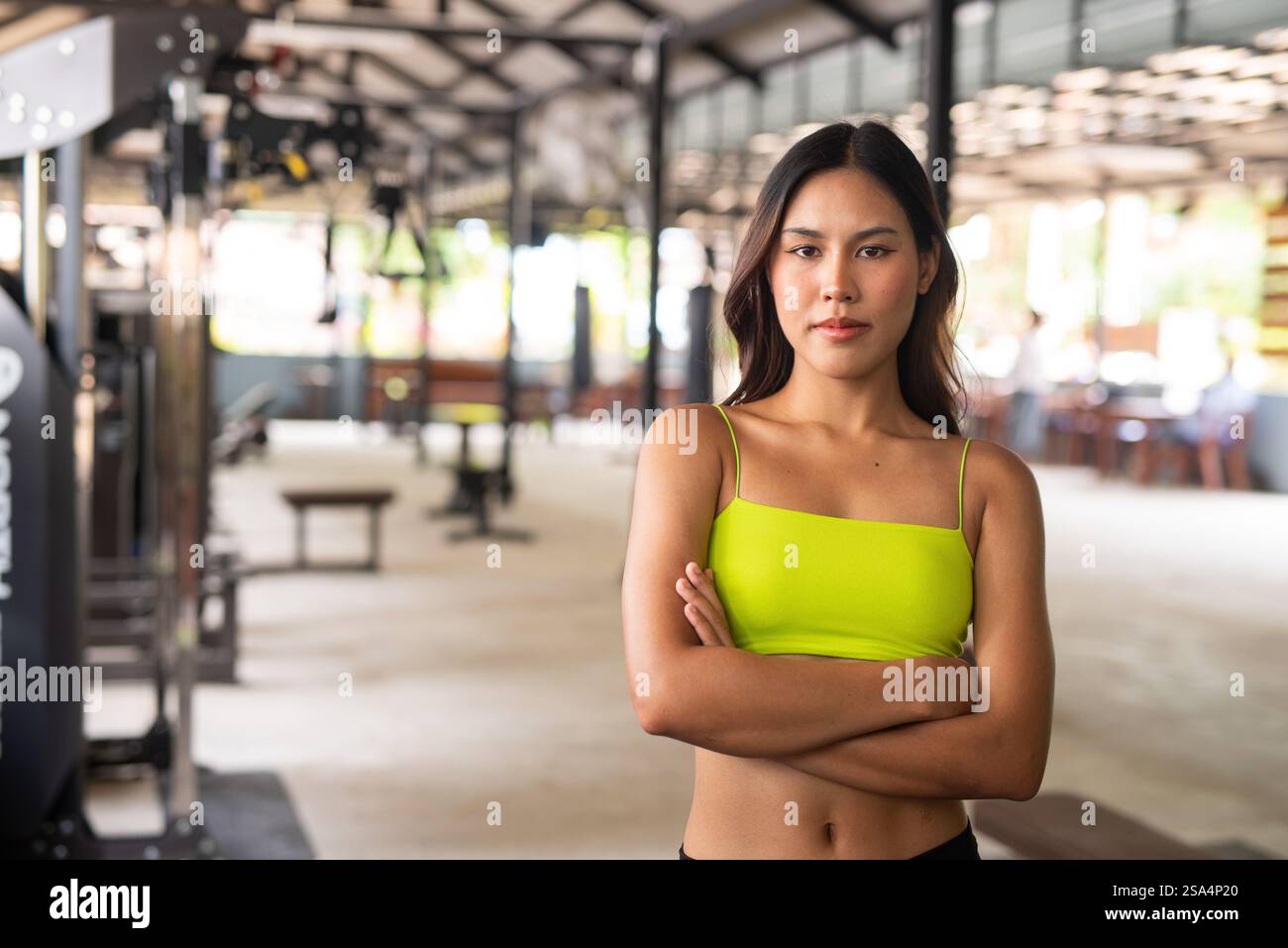 Young beautiful Asian woman at gym during summer Stock Photo - Alamy