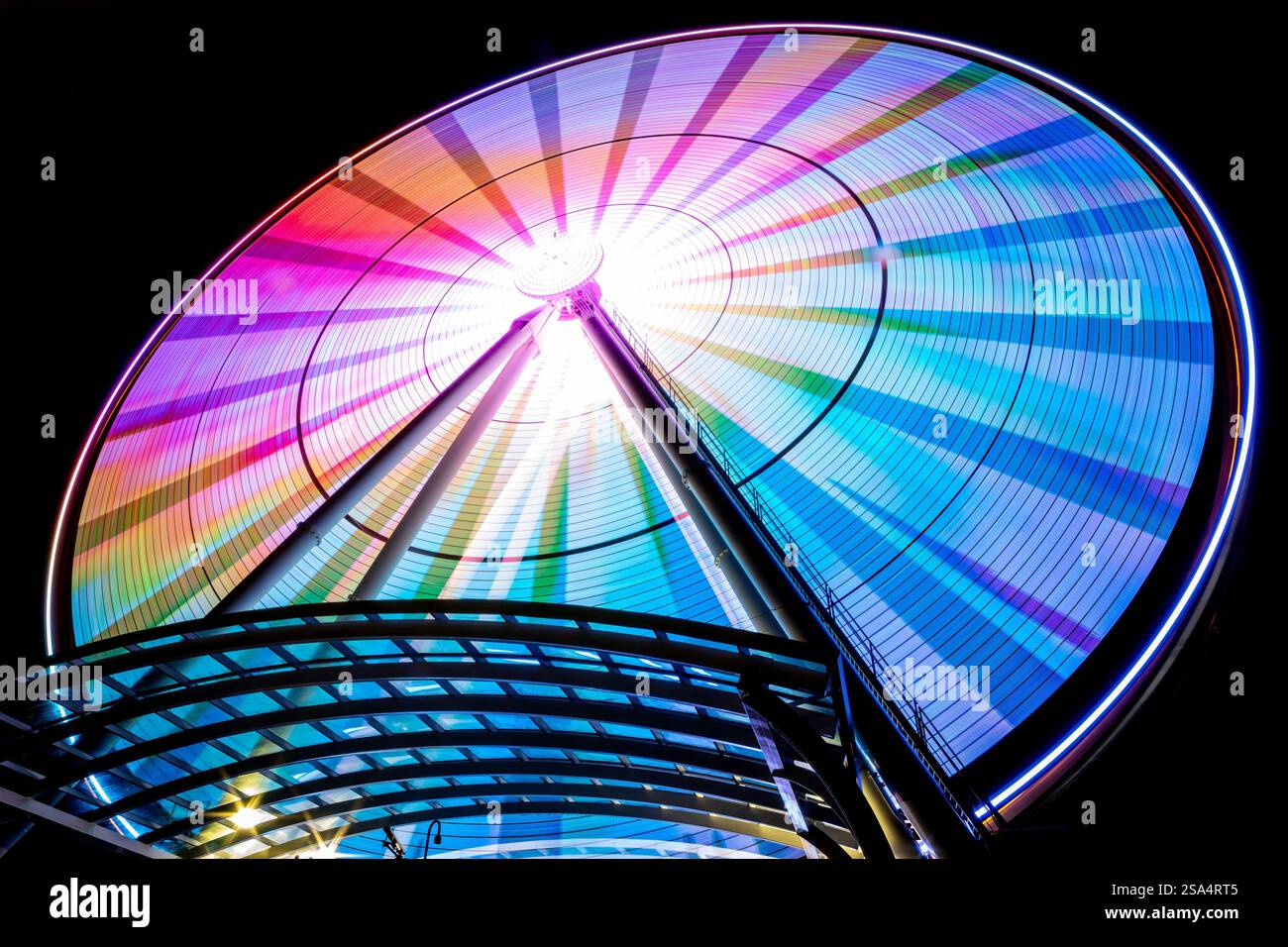 An artistic wide-angle fisheye view of the Seattle Great Wheel glowing ...