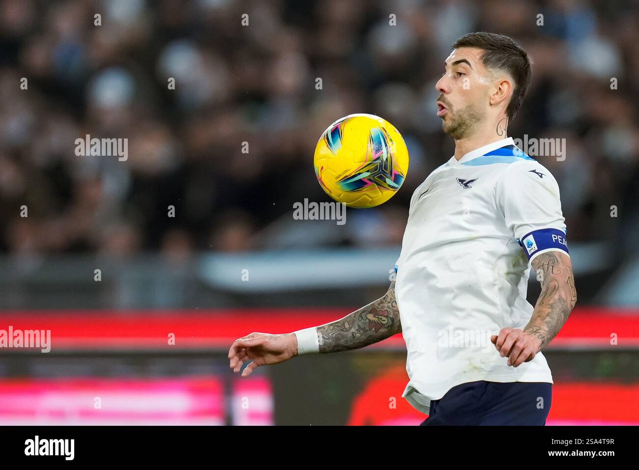 Rome, Italy. 26th Jan, 2025. Mattia Zaccagni of SS Lazio controls the ...