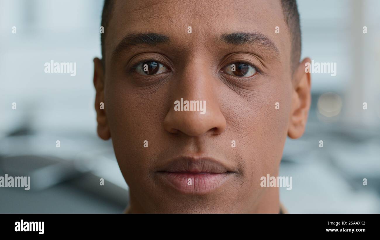 Close-up in details serious worried african american man raise head ...