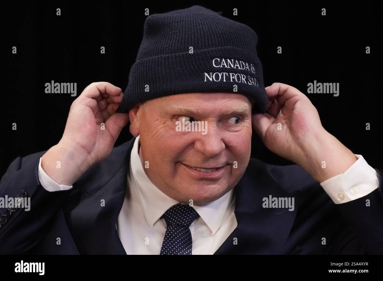 Toronto, Can. 28th Jan, 2025. Ontario Premier Doug Ford dons a toque ...