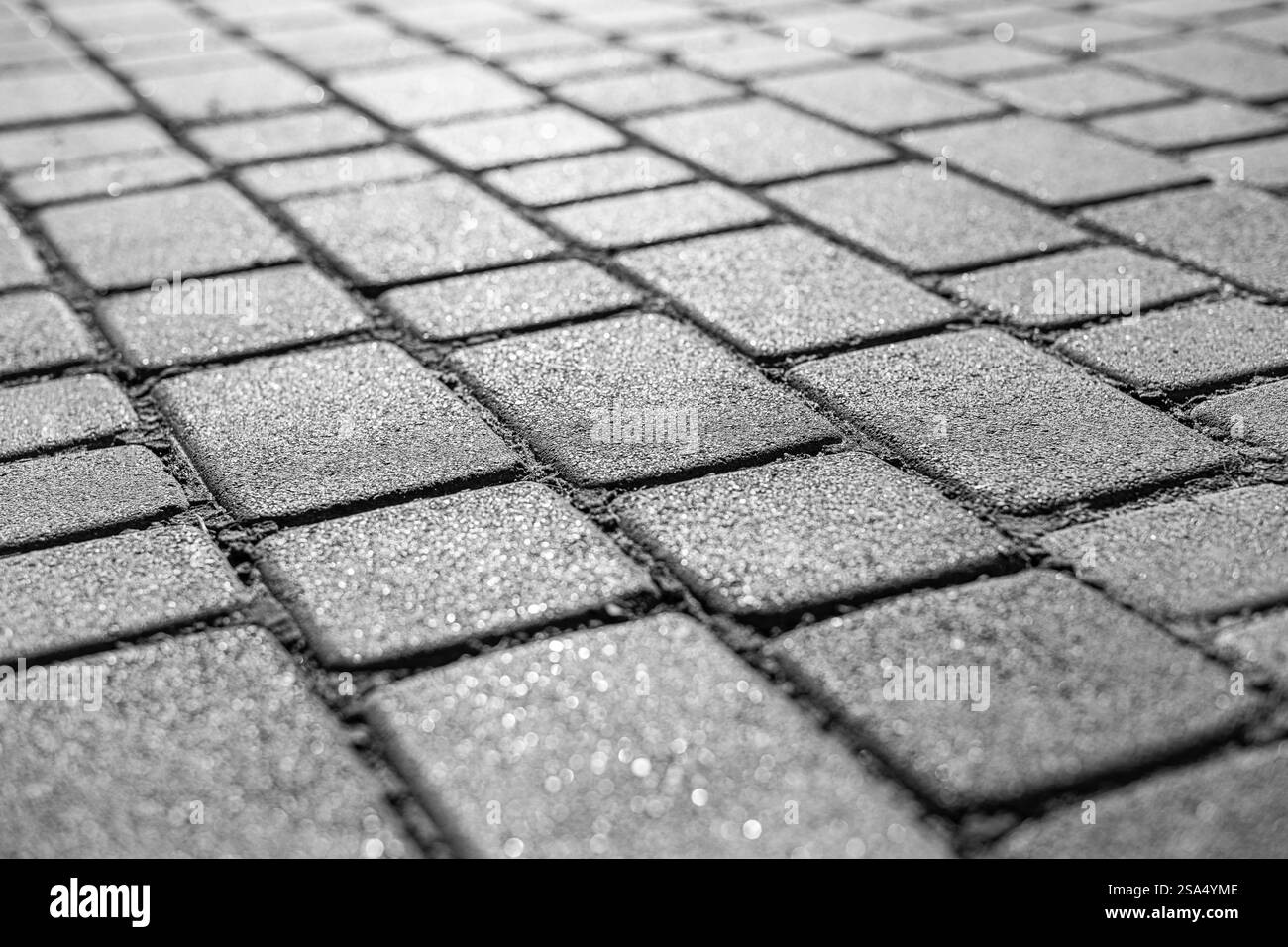Concrete road paving stones background Stock Photo - Alamy