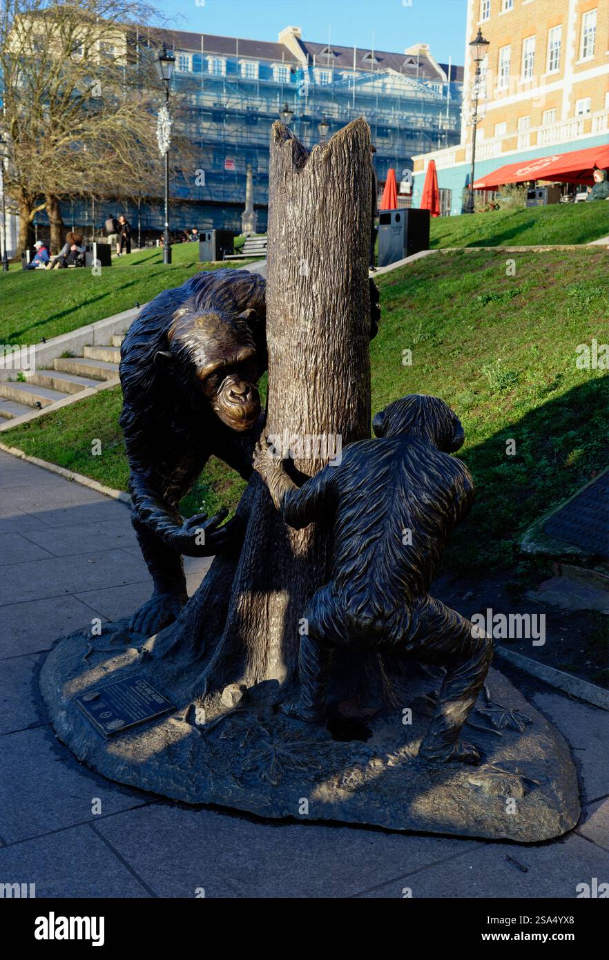The statue of Luca and Aiden the chimpanzees playing around a tree ...