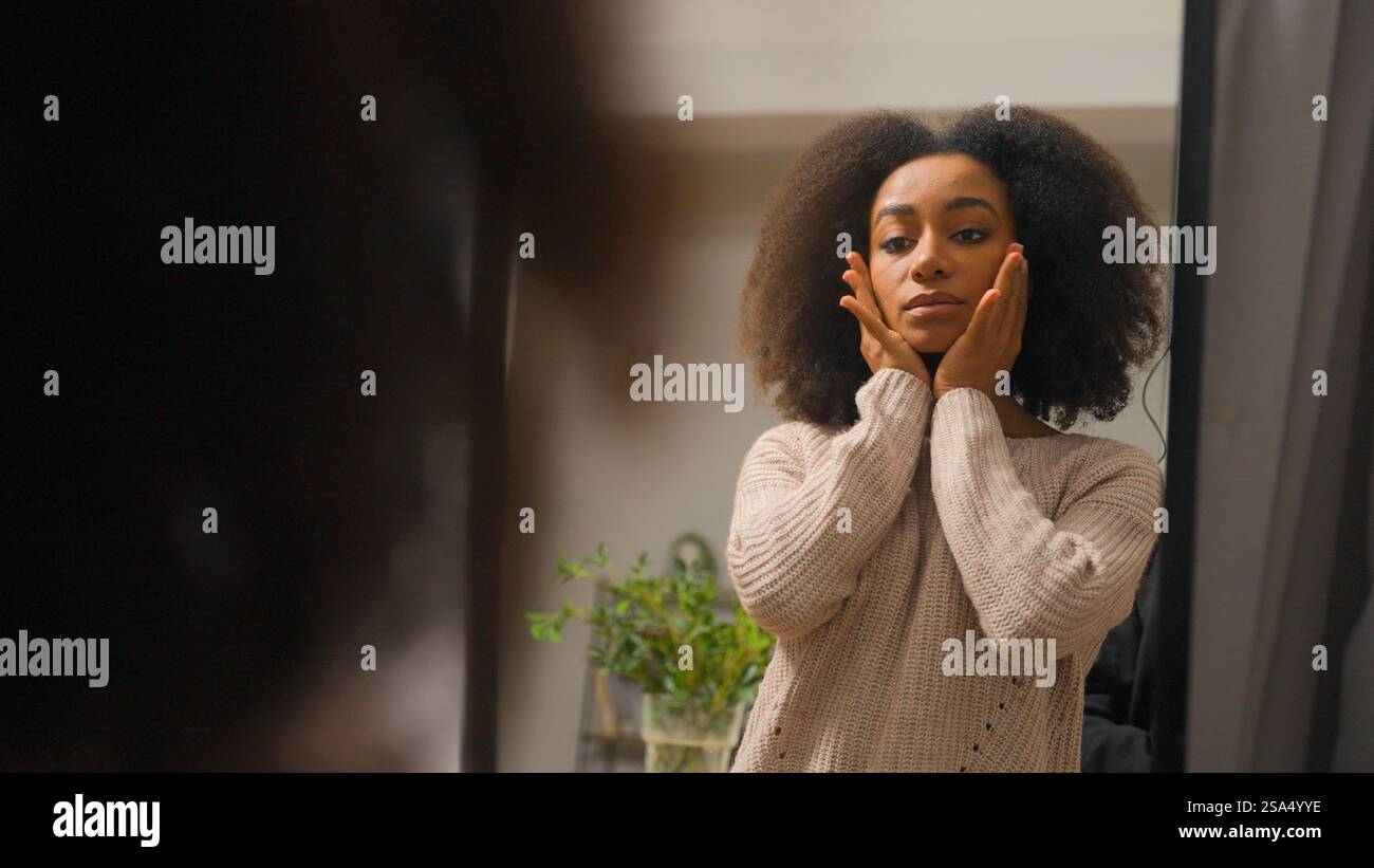 Beauty routine African American girl woman ethnic female model looking ...