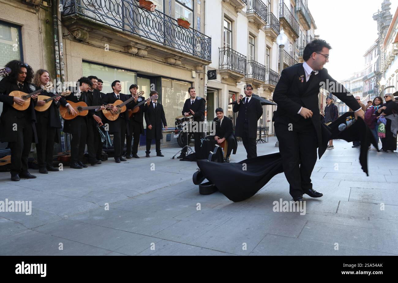 A group of Tuna, the university student music group members in academic ...