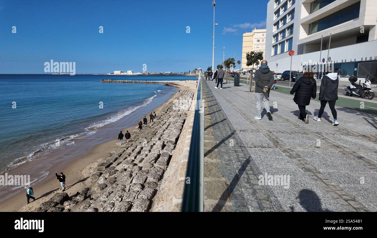 A scenic waterfront promenade in Cádiz, with Playa de Santa María del ...
