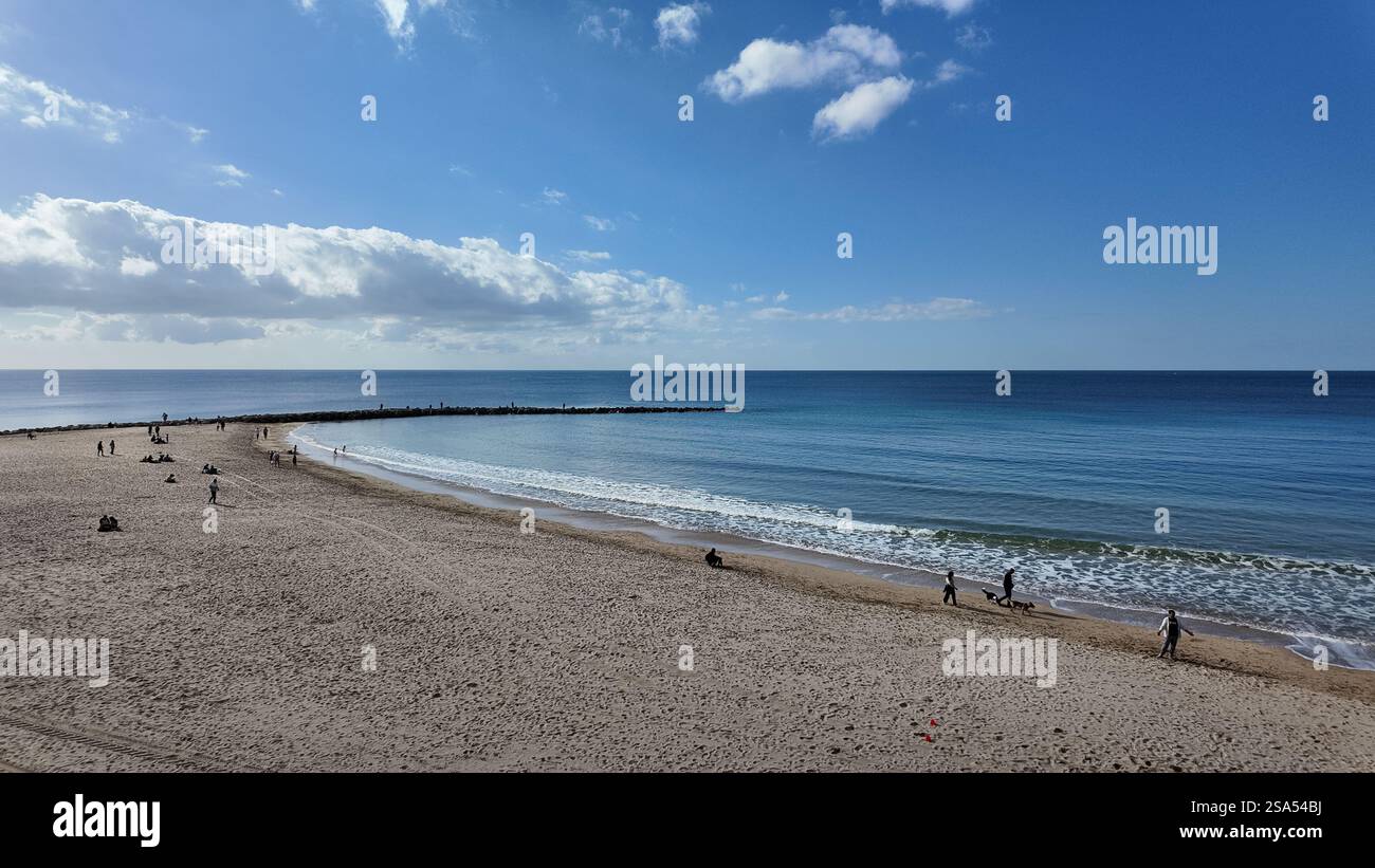 Playa de Santa María del Mar is a serene beach with golden sand, rocky ...