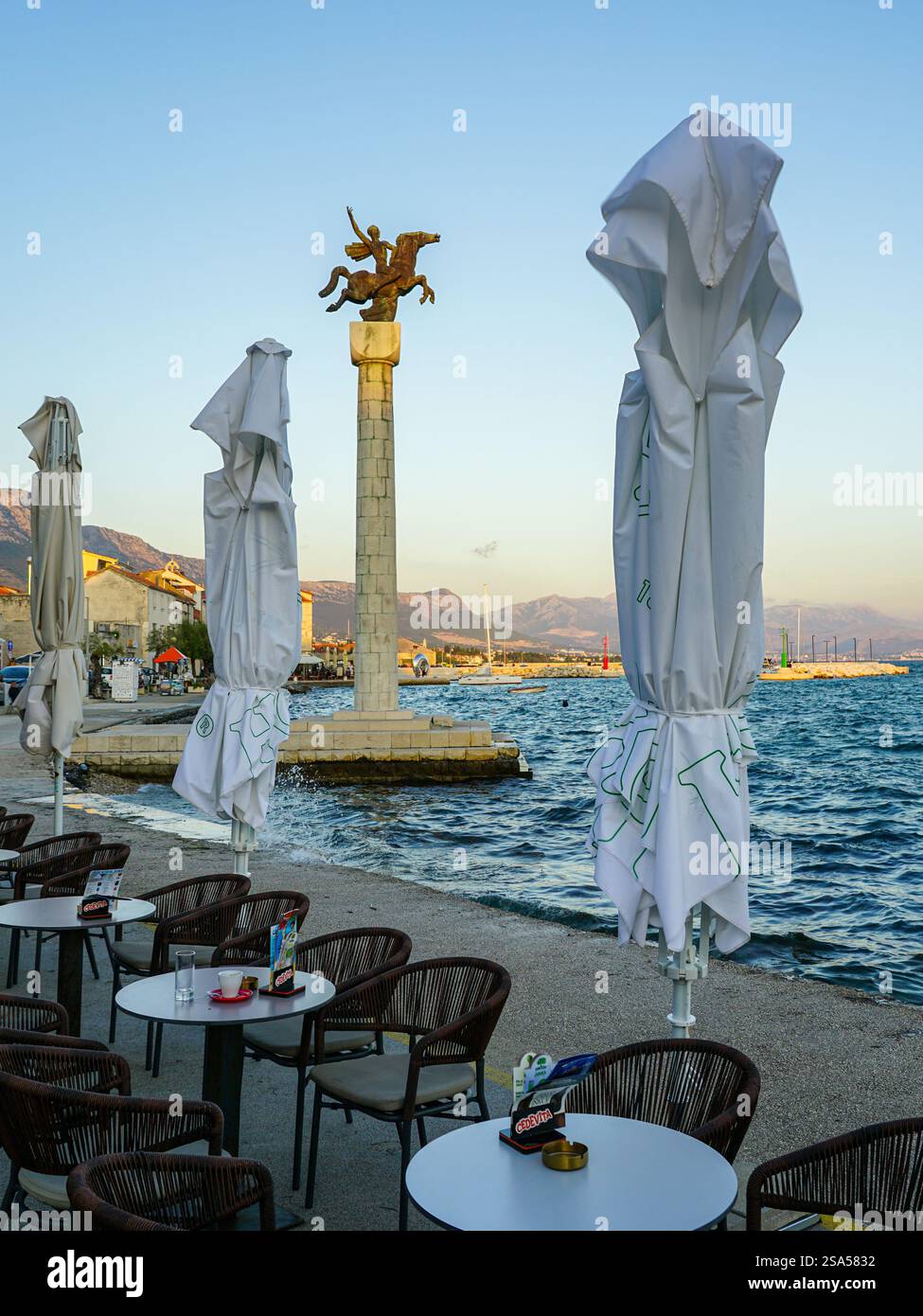Adriatic Riviera, Kastel Stari waterfront promenade with cafe tables ...
