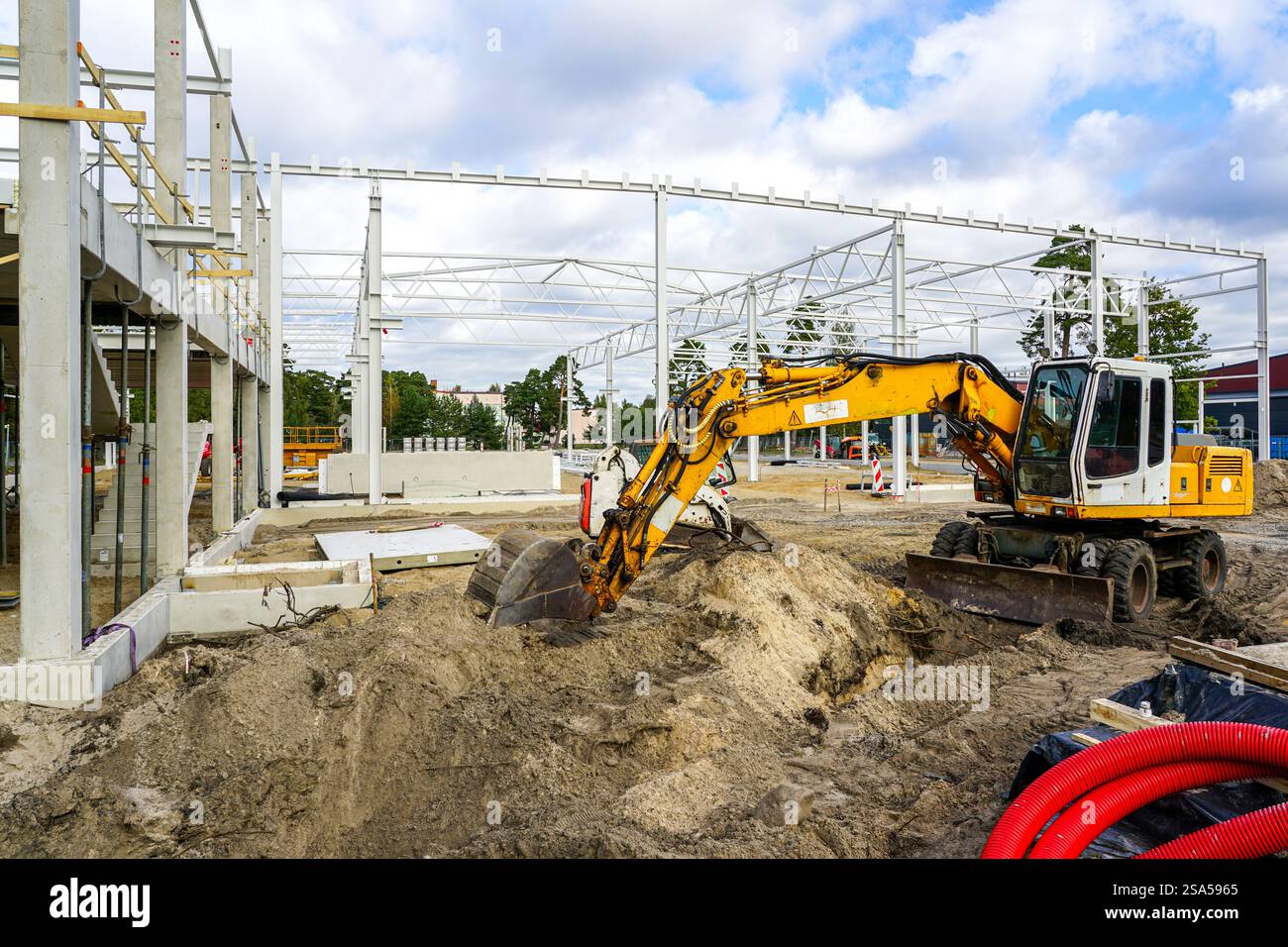 Construction site of a new modern factory reinforced concrete and metal ...