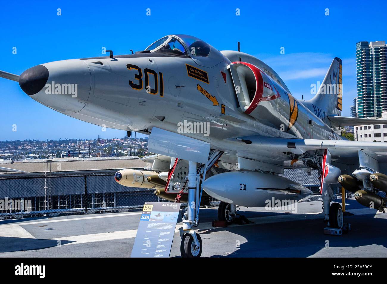 A fighter jet with the number 30 on the side. The jet is parked on a ...