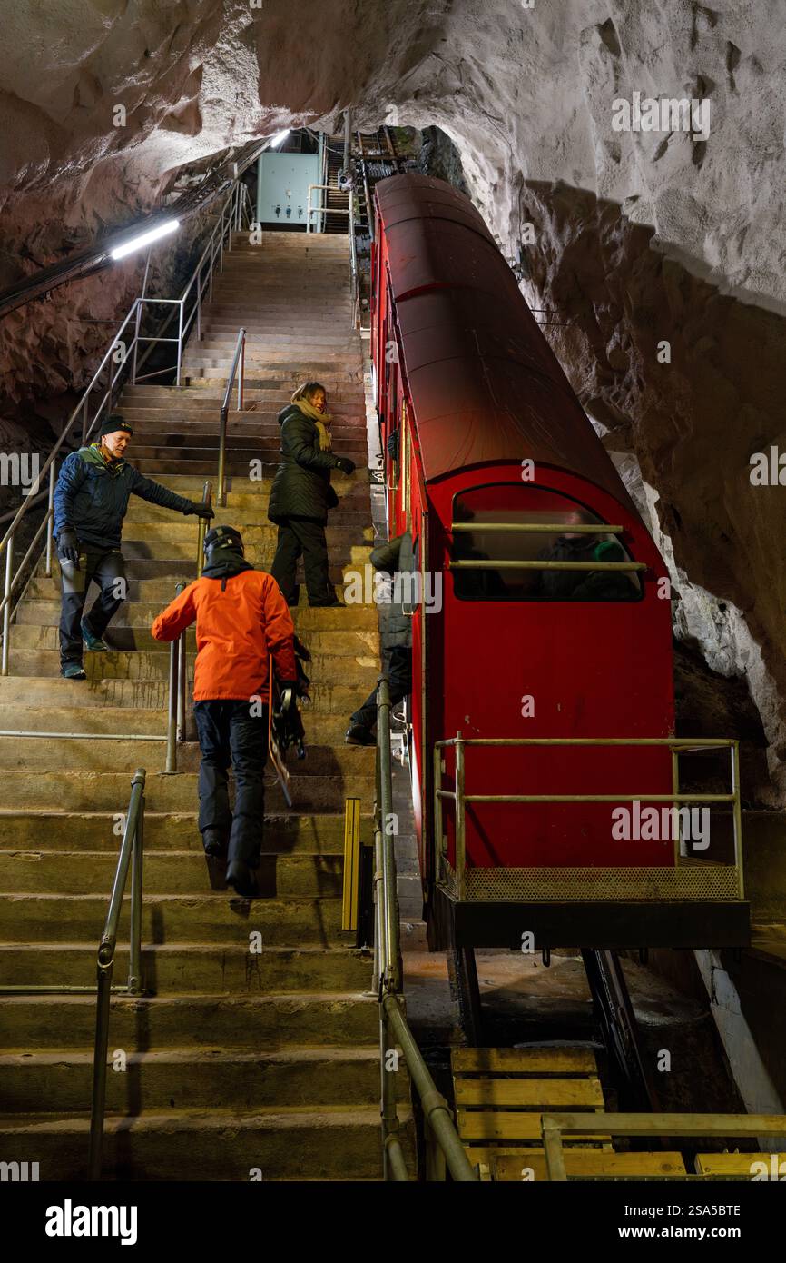 Passengers boarding the Gaustabanen funicular train in Norway's ...