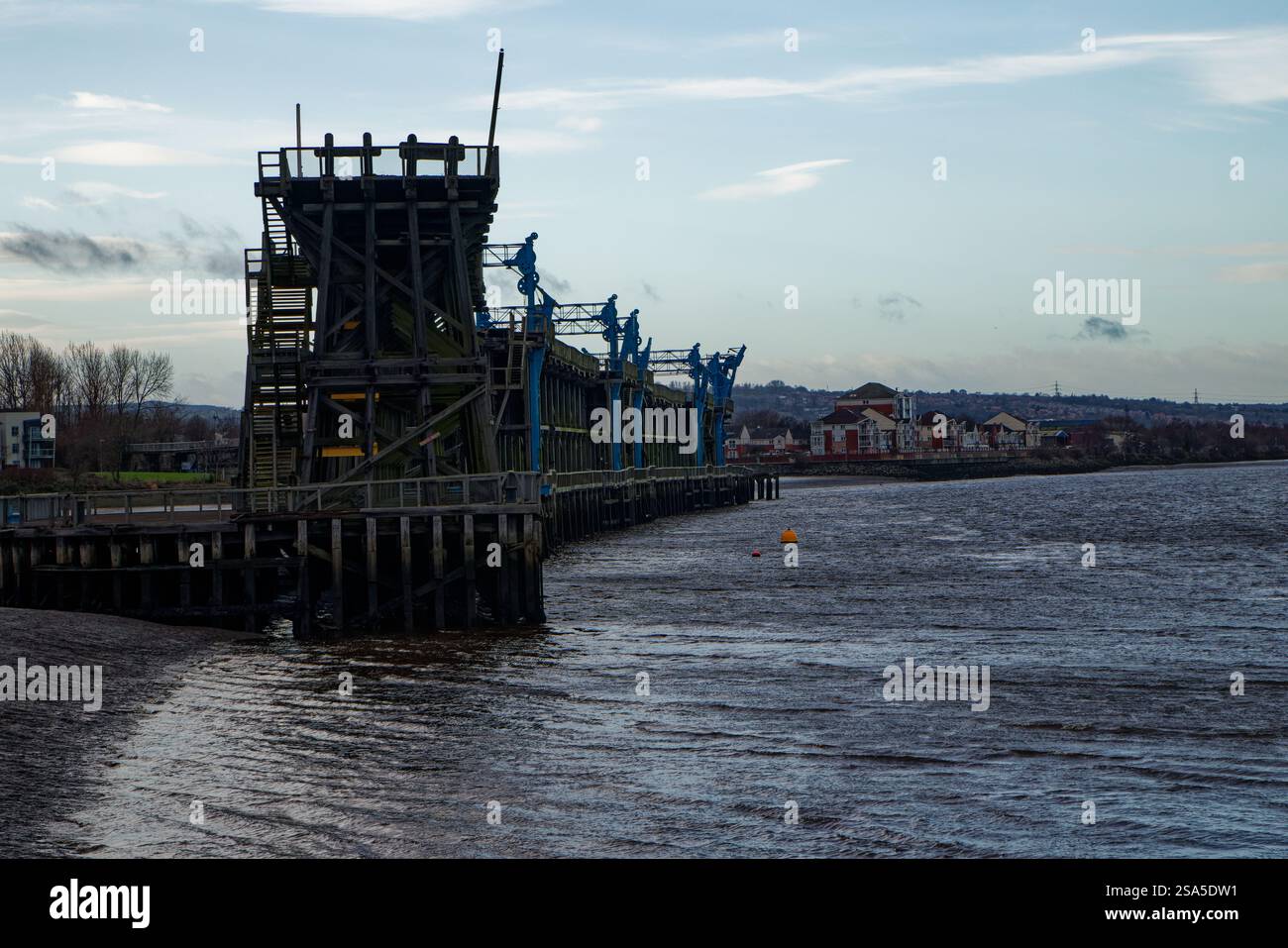 River mud at the mouth of the Tidal Lagoon at Dunston Staithes ...