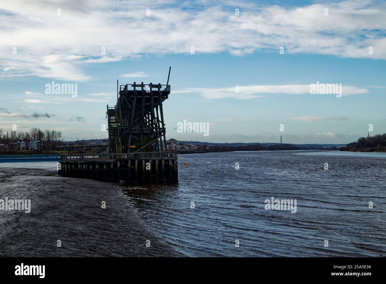 River mud at the mouth of the Tidal Lagoon at Dunston Staithes ...
