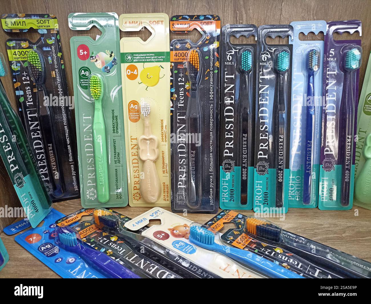 Assorted toothbrushes for various age groups with different bristle ...