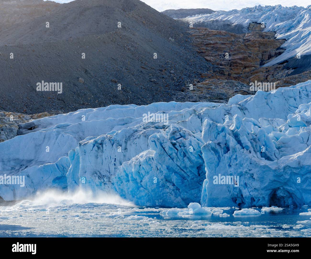 Calving of an iceberg at Bruckner Glacier. Landscape in the Johan ...