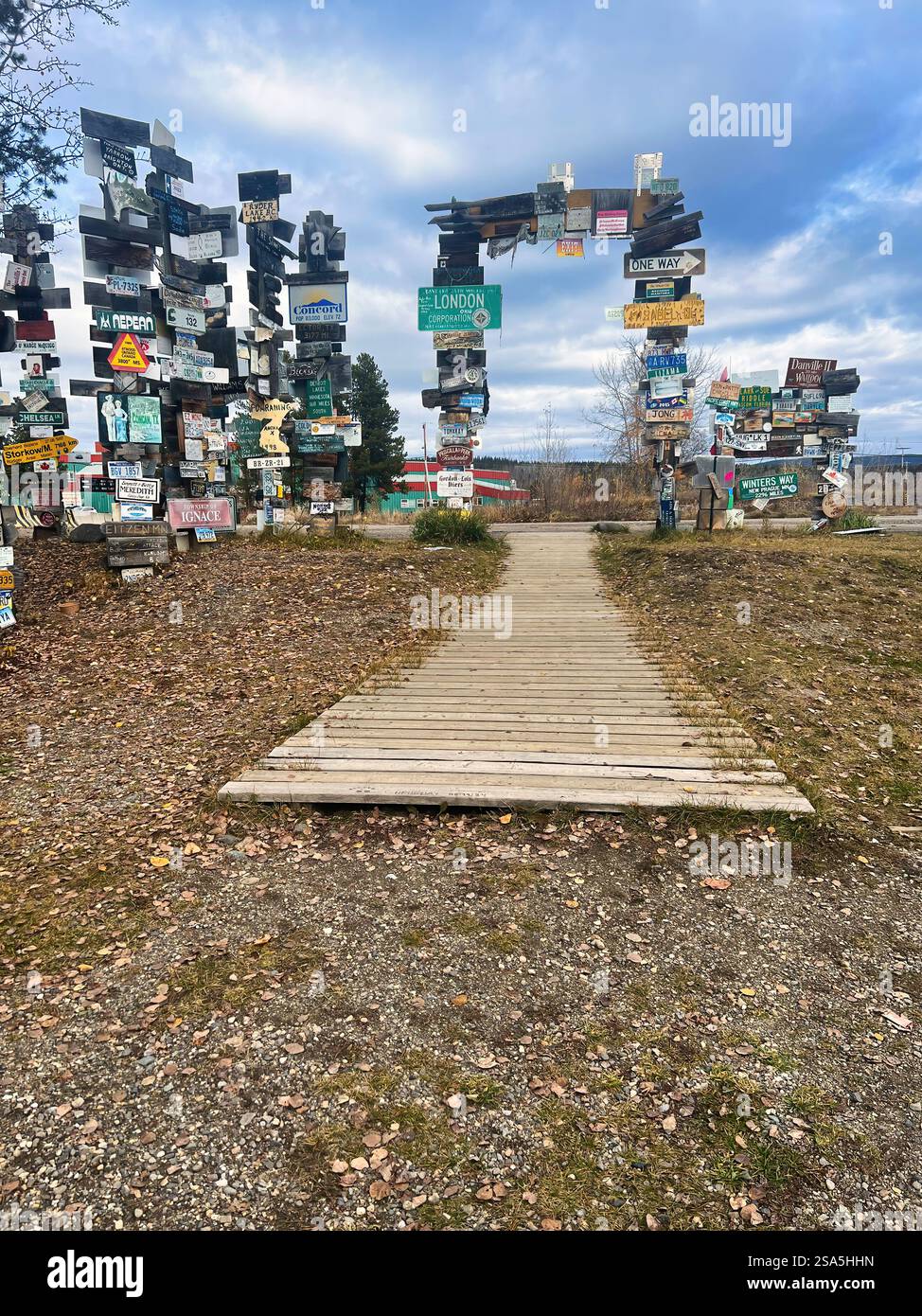 Watson Lake, Canada - October 9, 2024: Wood path at the exit of Sign ...