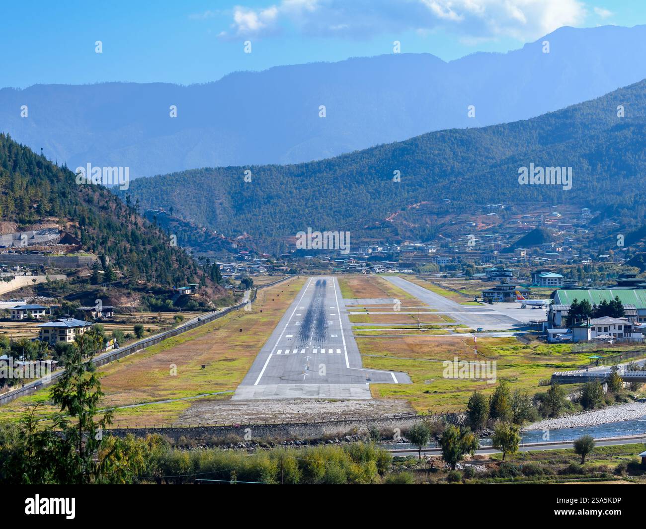 Paro International Airport runway in Paro Valley, Bhutan. Challenging ...