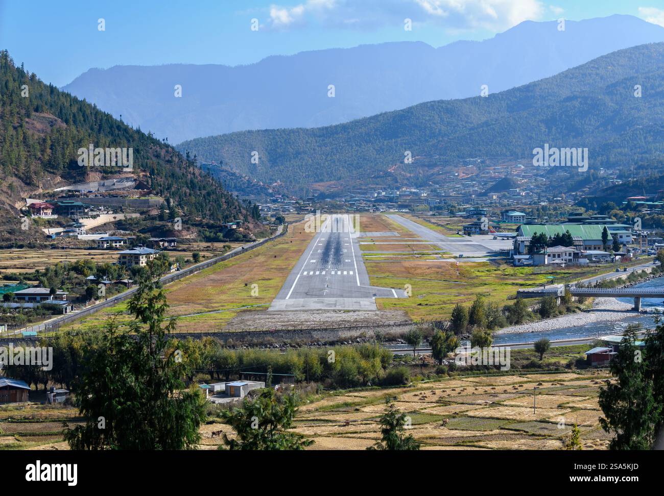 Paro International Airport runway in Paro Valley, Bhutan. Challenging ...