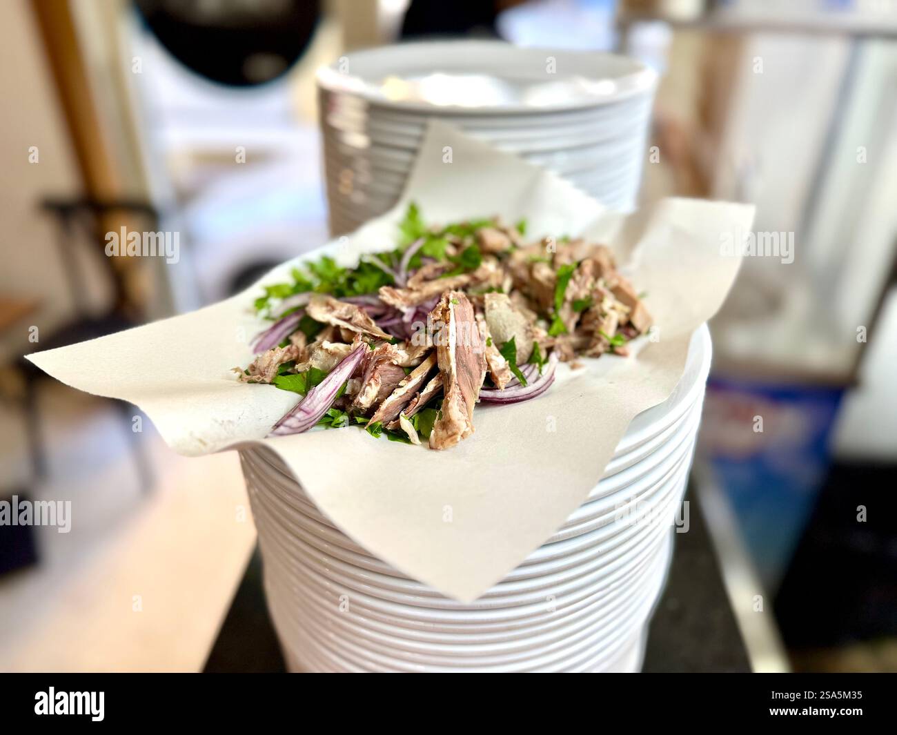 Offal sandwich Traditional Turkish cuisine food kelle sogus. Sogus made ...