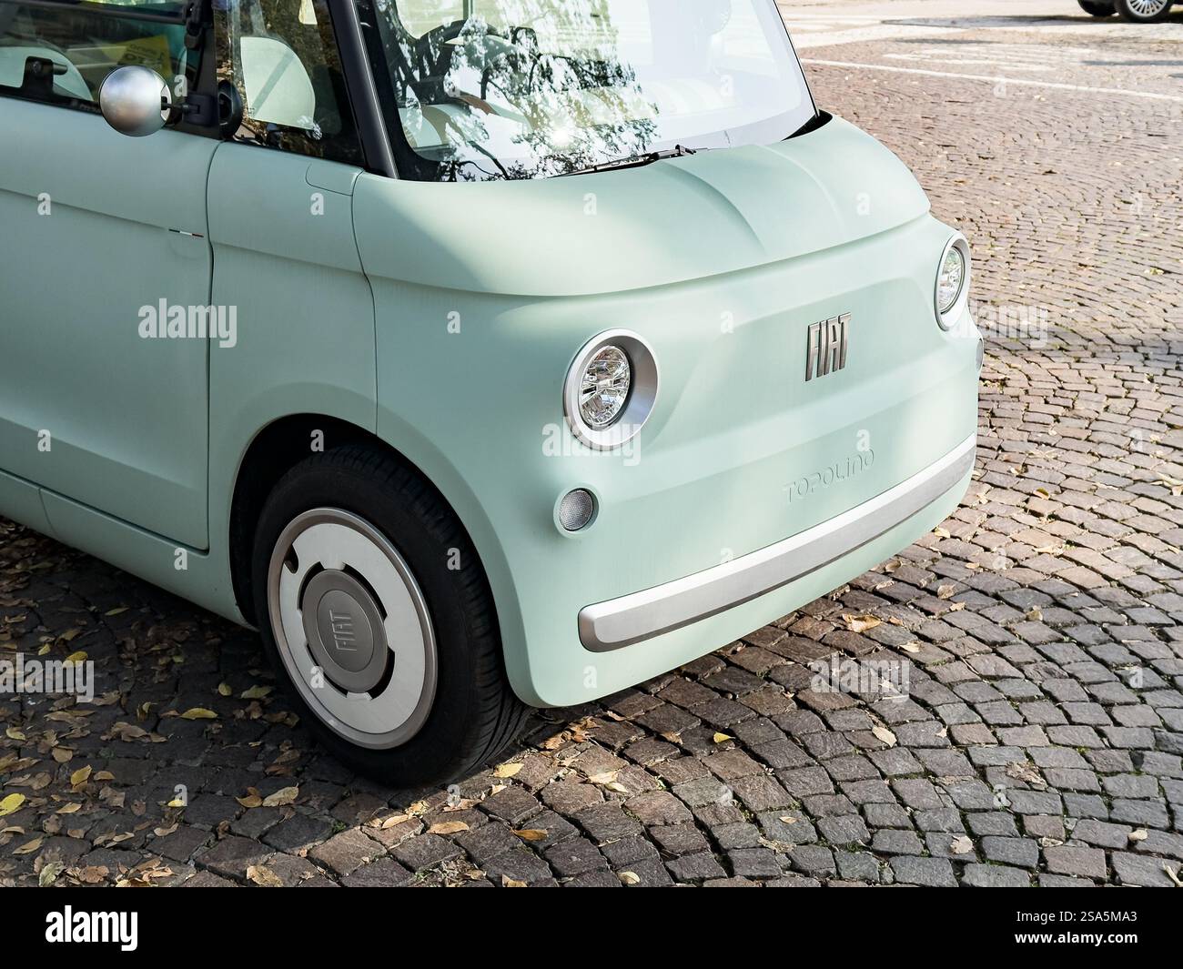 VERONA, ITALY - OCTOBER 29, 2024: Frontal part of micro electric car ...