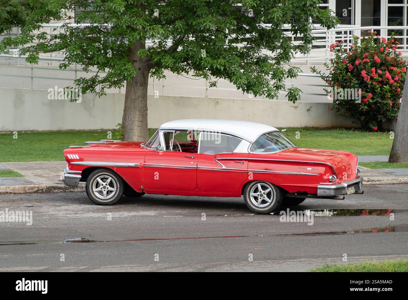 HAVANA, CUBA - AUGUST 28, 2023: Rear side view of red Chevrolet Bel Air ...