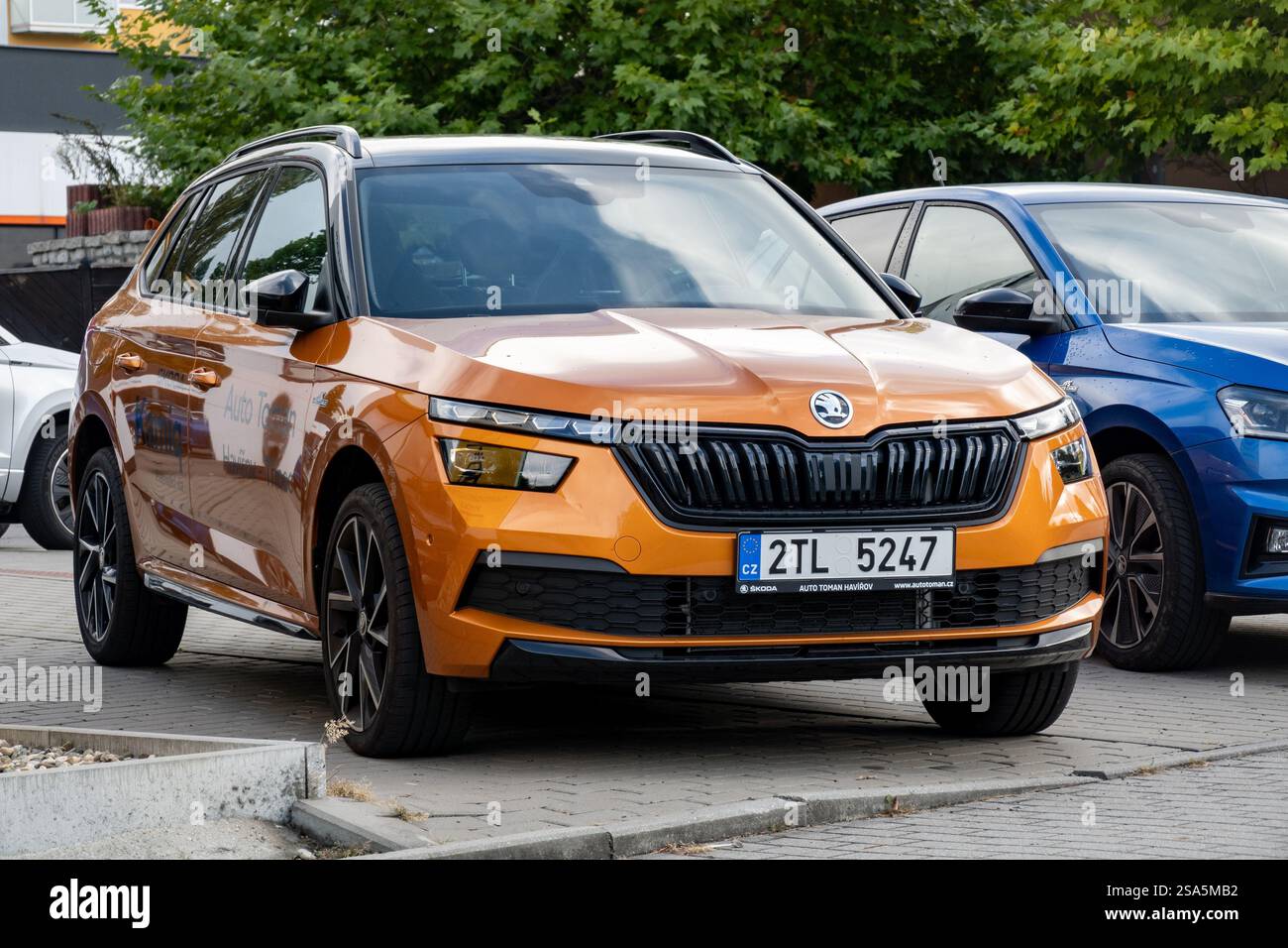 HAVIROV, CZECH REPUBLIC - OCTOBER 6, 2023: Orange SUV Skoda Karoq car ...