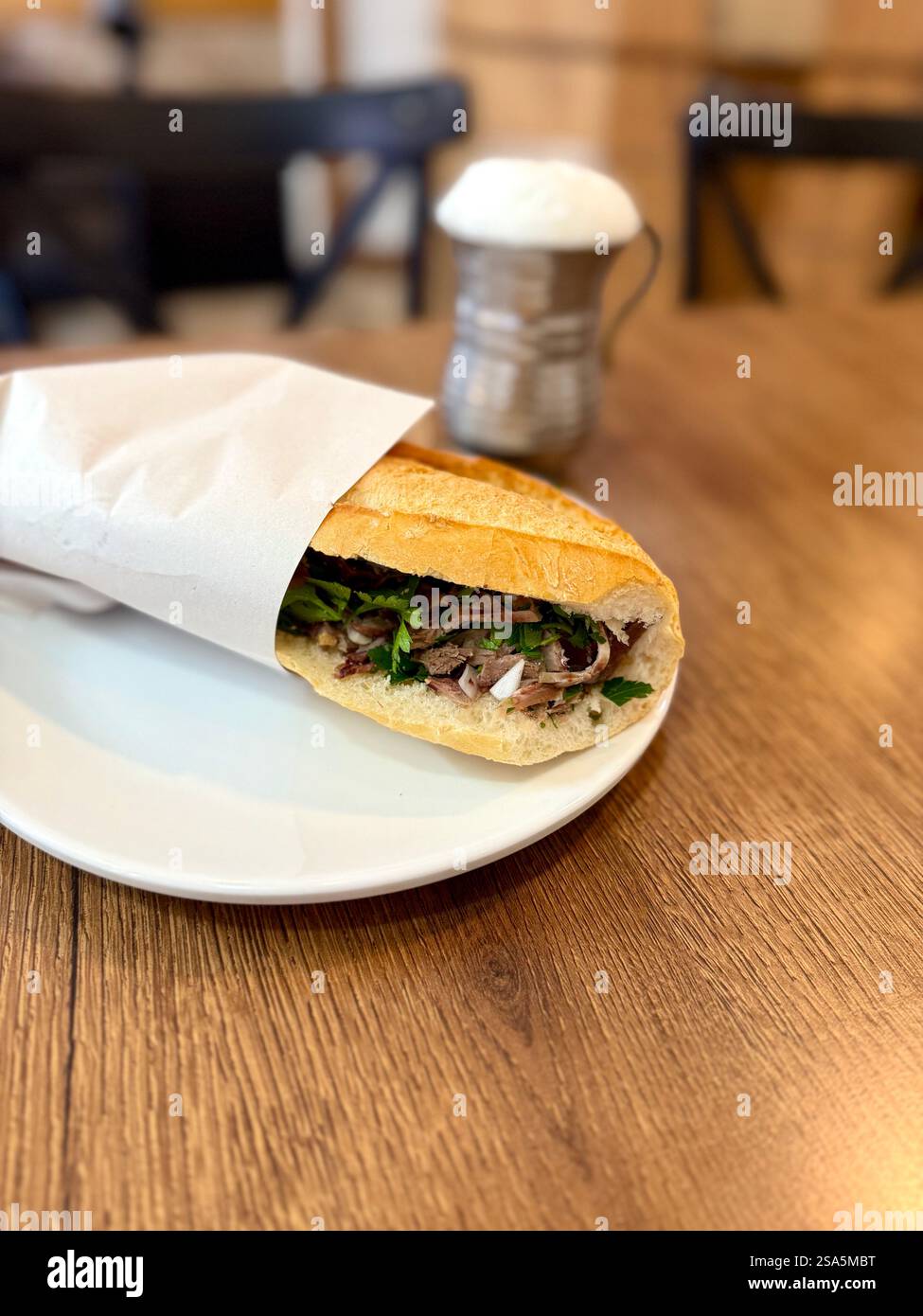 Offal sandwich Traditional Turkish cuisine food kelle sogus. Sogus made ...