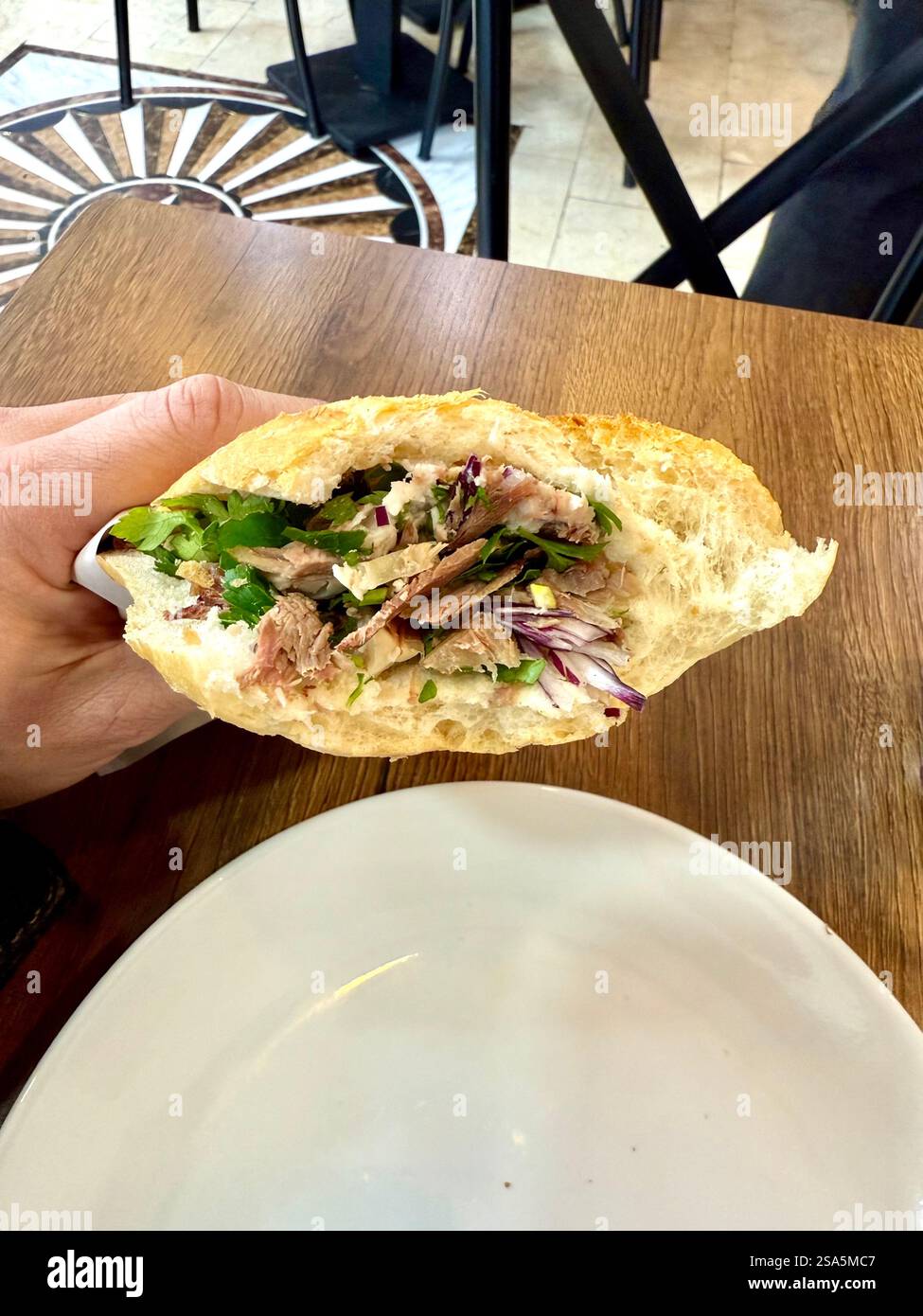Offal sandwich Traditional Turkish cuisine food kelle sogus. Sogus made ...