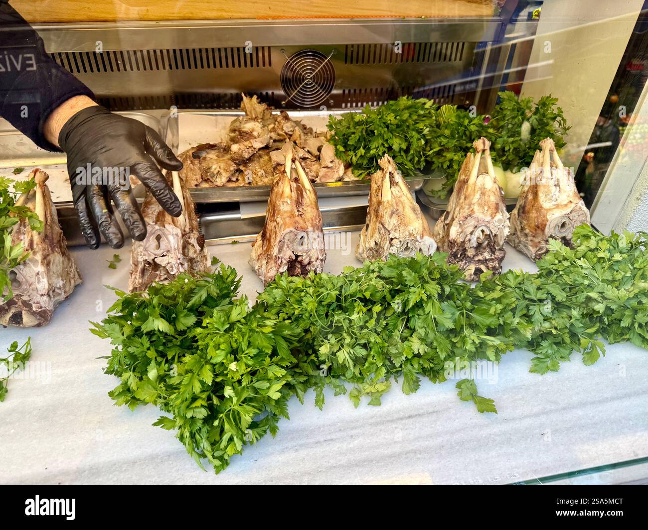 Offal sandwich Traditional Turkish cuisine food kelle sogus. Sogus made ...