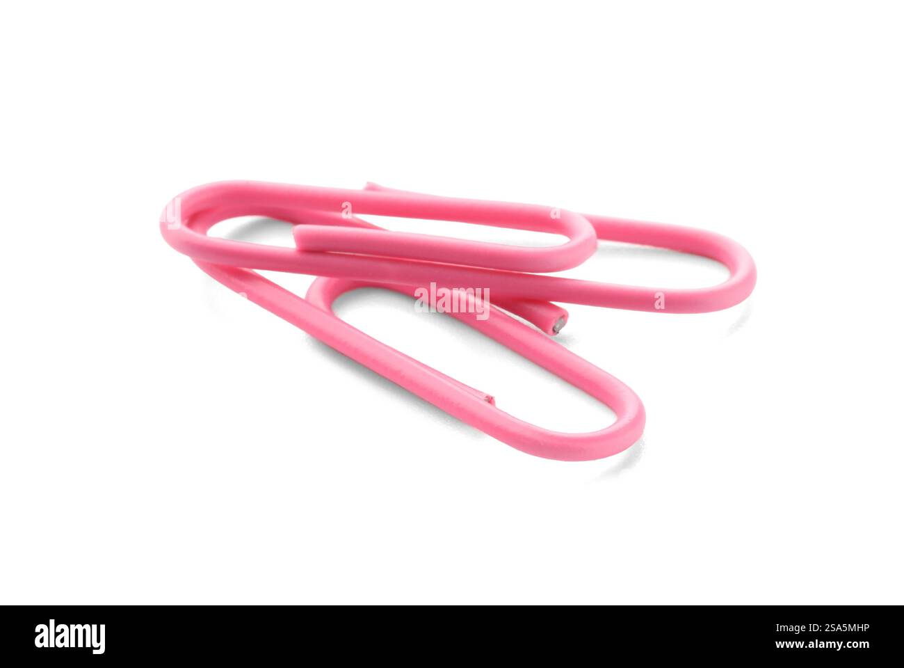 Two pink paper clips isolated on white Stock Photo - Alamy