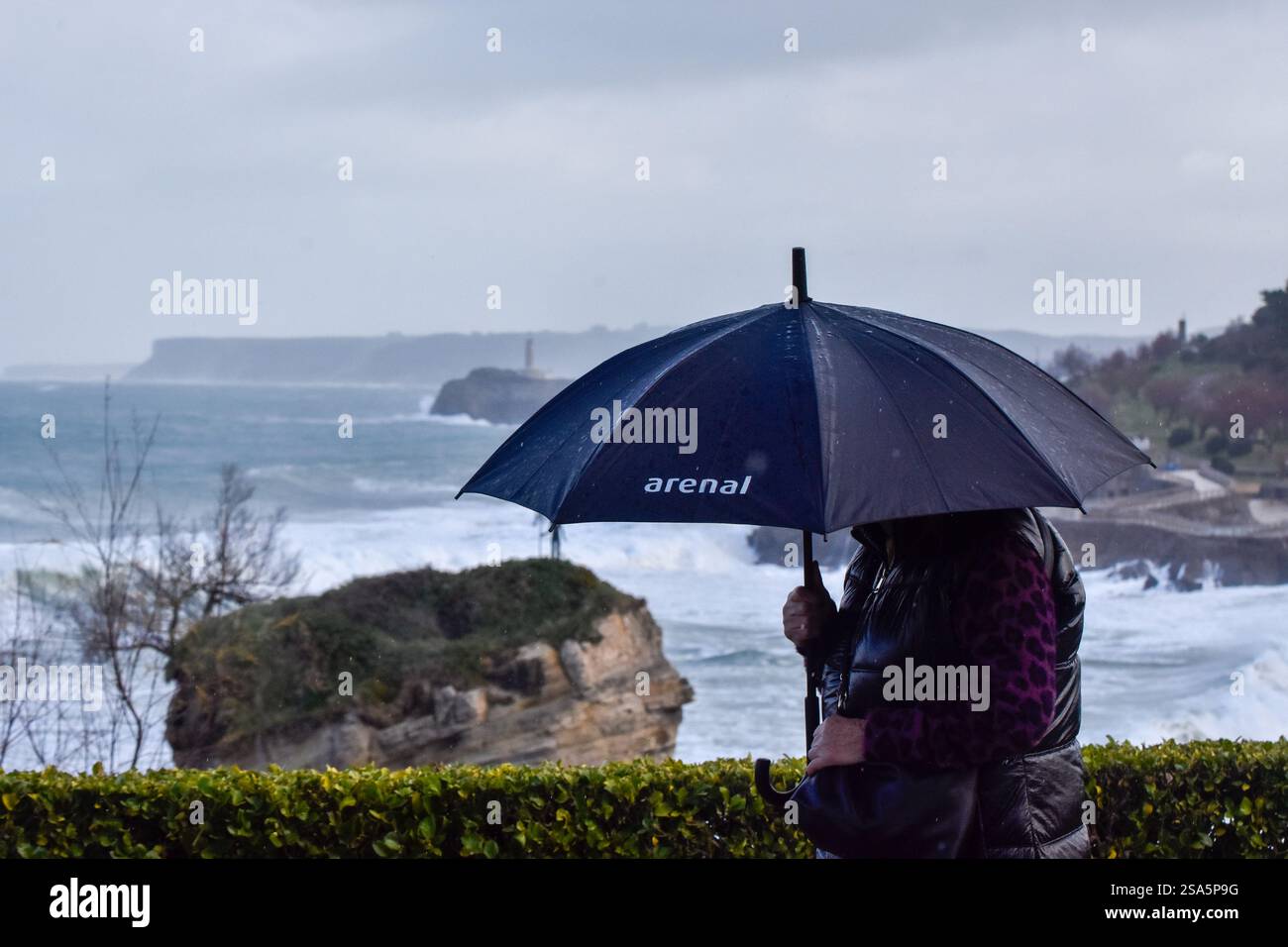 Santander, Cantabria, Spain, January 28, 2025, People walk in bad ...
