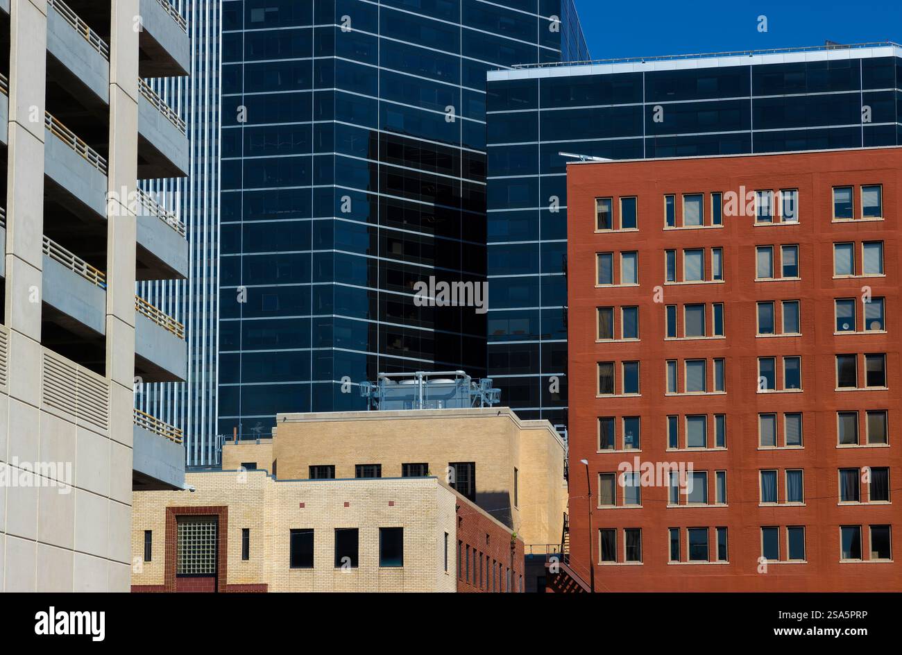 Close up of a group of buildings of different shapes and sizes in ...