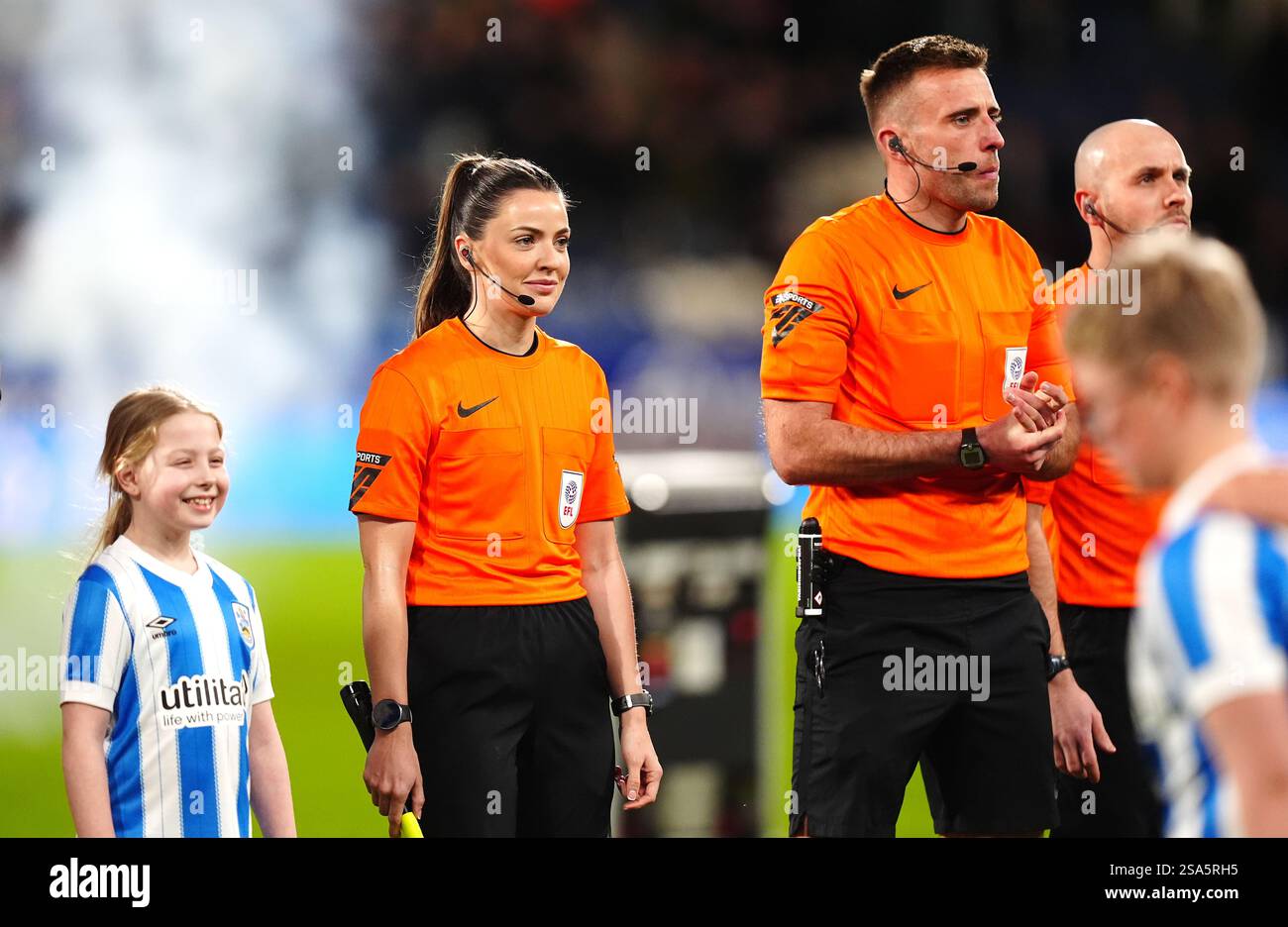 Assistant referee Emily Carney (left) and referee Adam Herczeg before ...