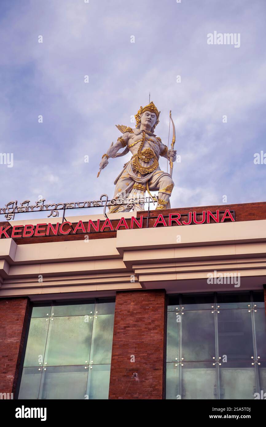 Bali, Indonesia: A magnificent golden statue depicting Arjuna from ...