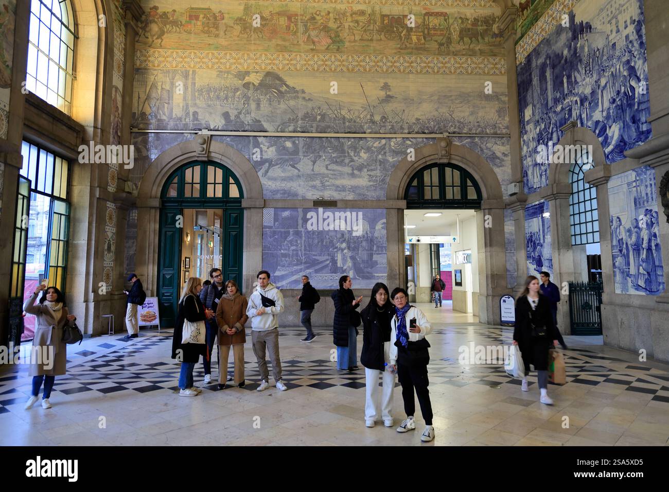Blue azulejo tile murals depicting the history of Portugal inside of ...