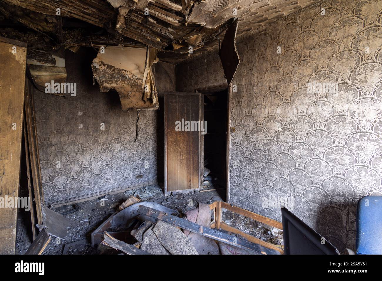 Photo of an extremely run down property that has had a massive fire ...