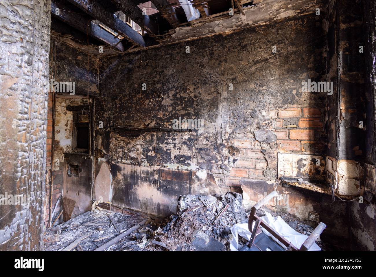 Photo of an extremely run down property that has had a massive fire ...