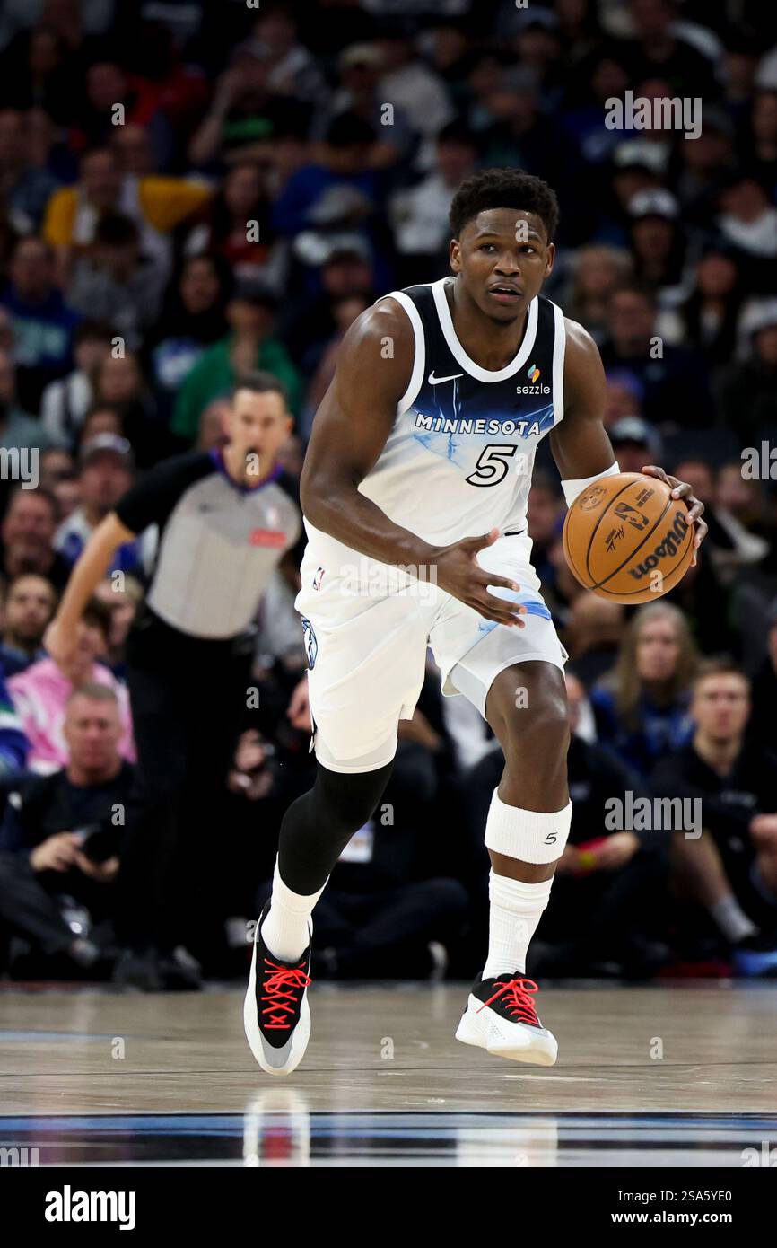 Minnesota Timberwolves guard Anthony Edwards (5) dribbles up the court ...