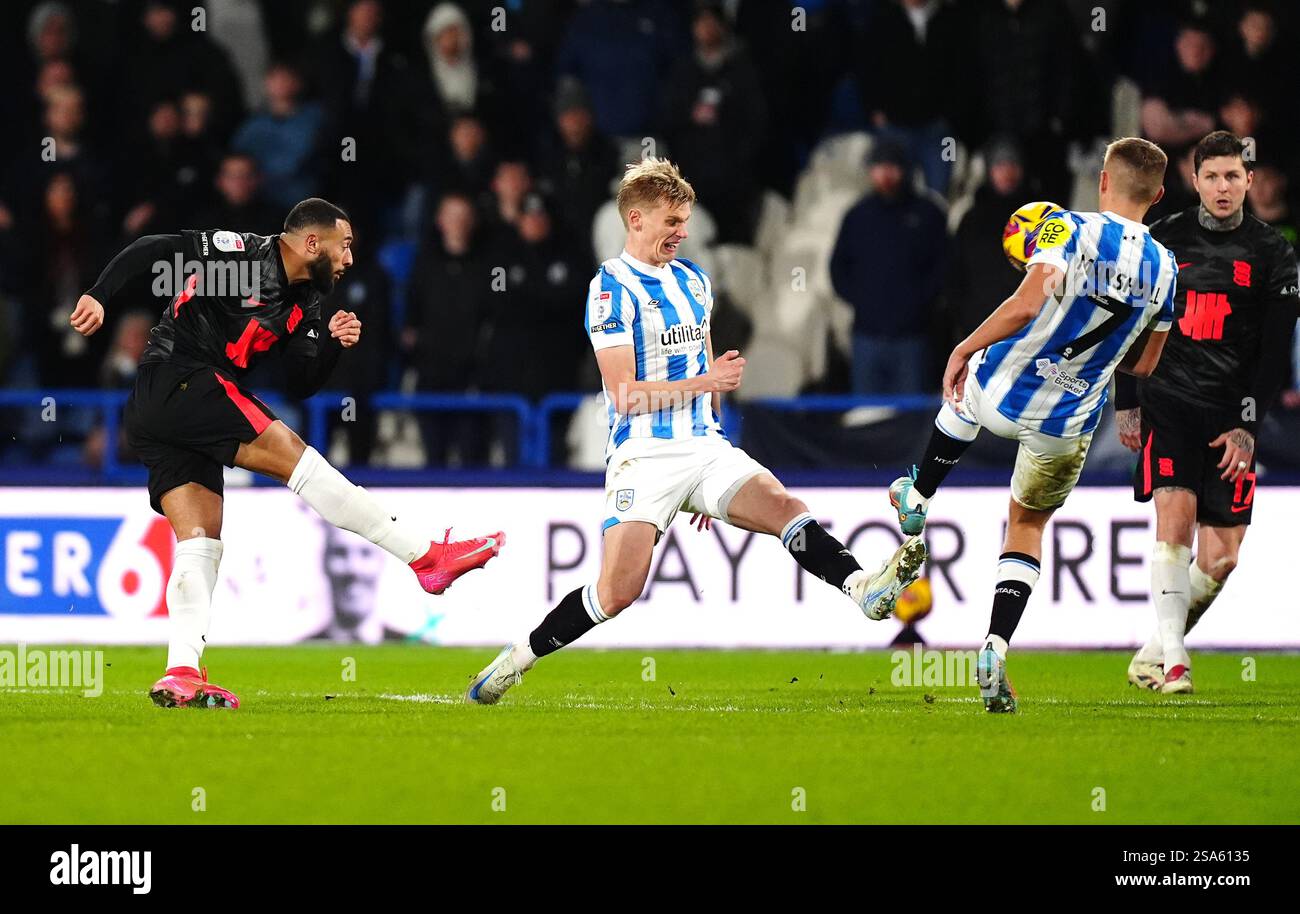Birmingham City's Keshi Anderson (left) scores their side's first goal ...