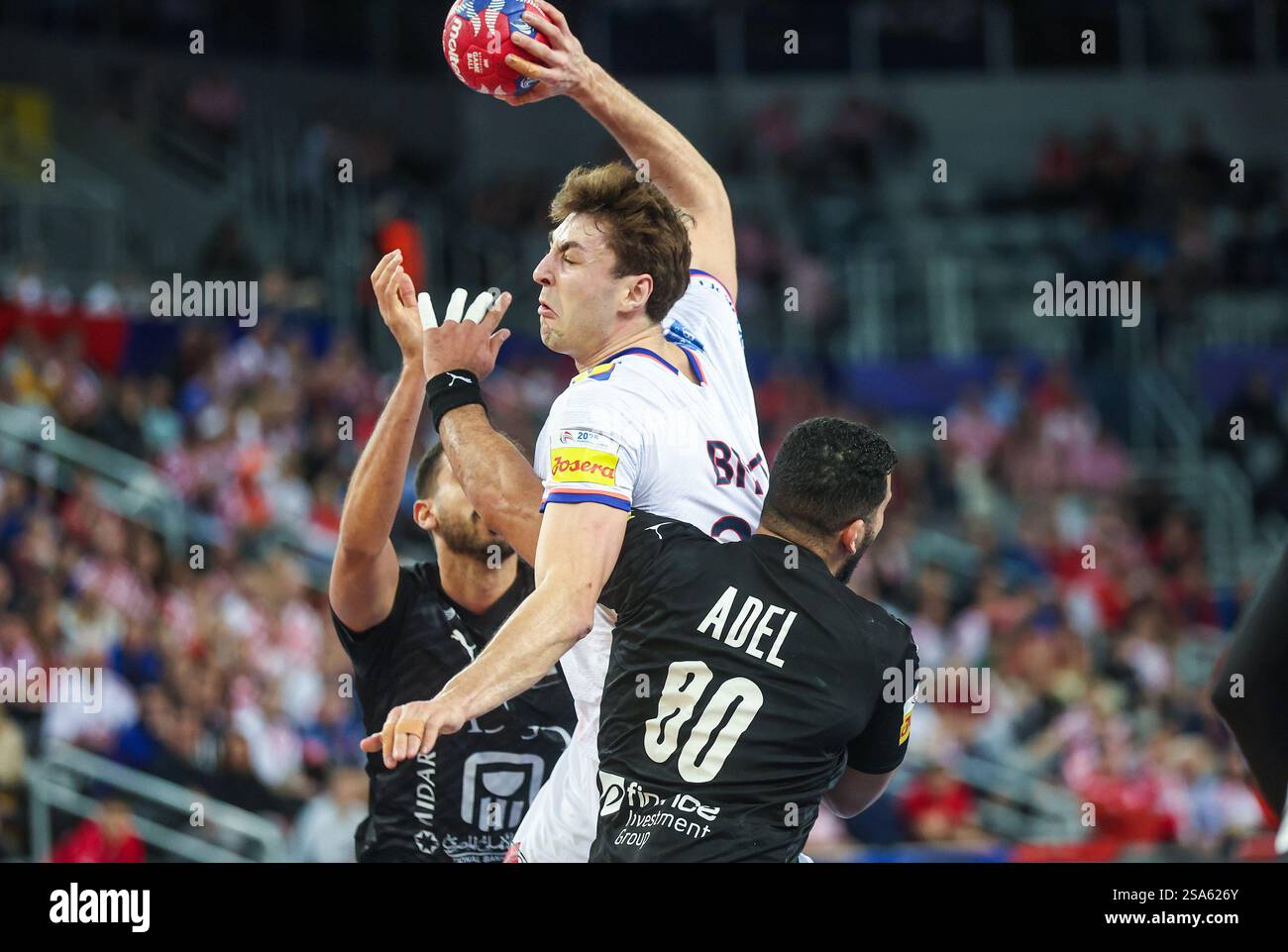Thibaud Briet of France is challenged by Yahia Omar and Ahmed Adel of ...