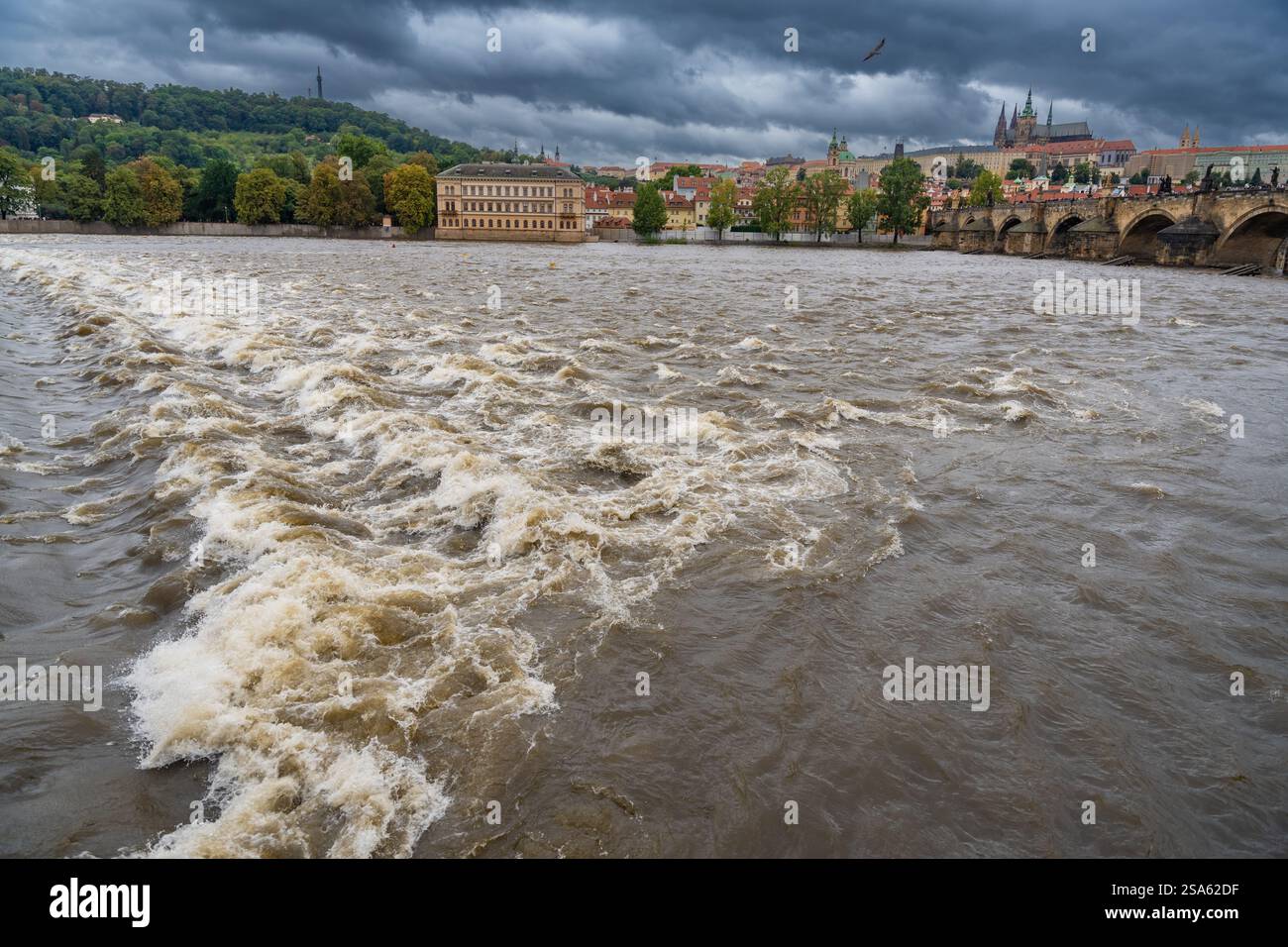 Flood in Prague. View of Prague Castle across the flooding river Vltava ...