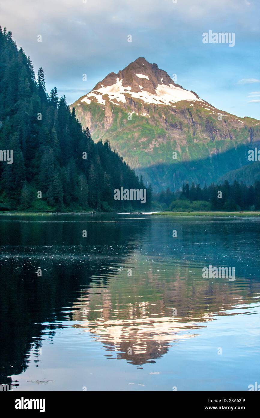 USA, Alaska, Tongass National Forest. Mountain and forest reflections ...